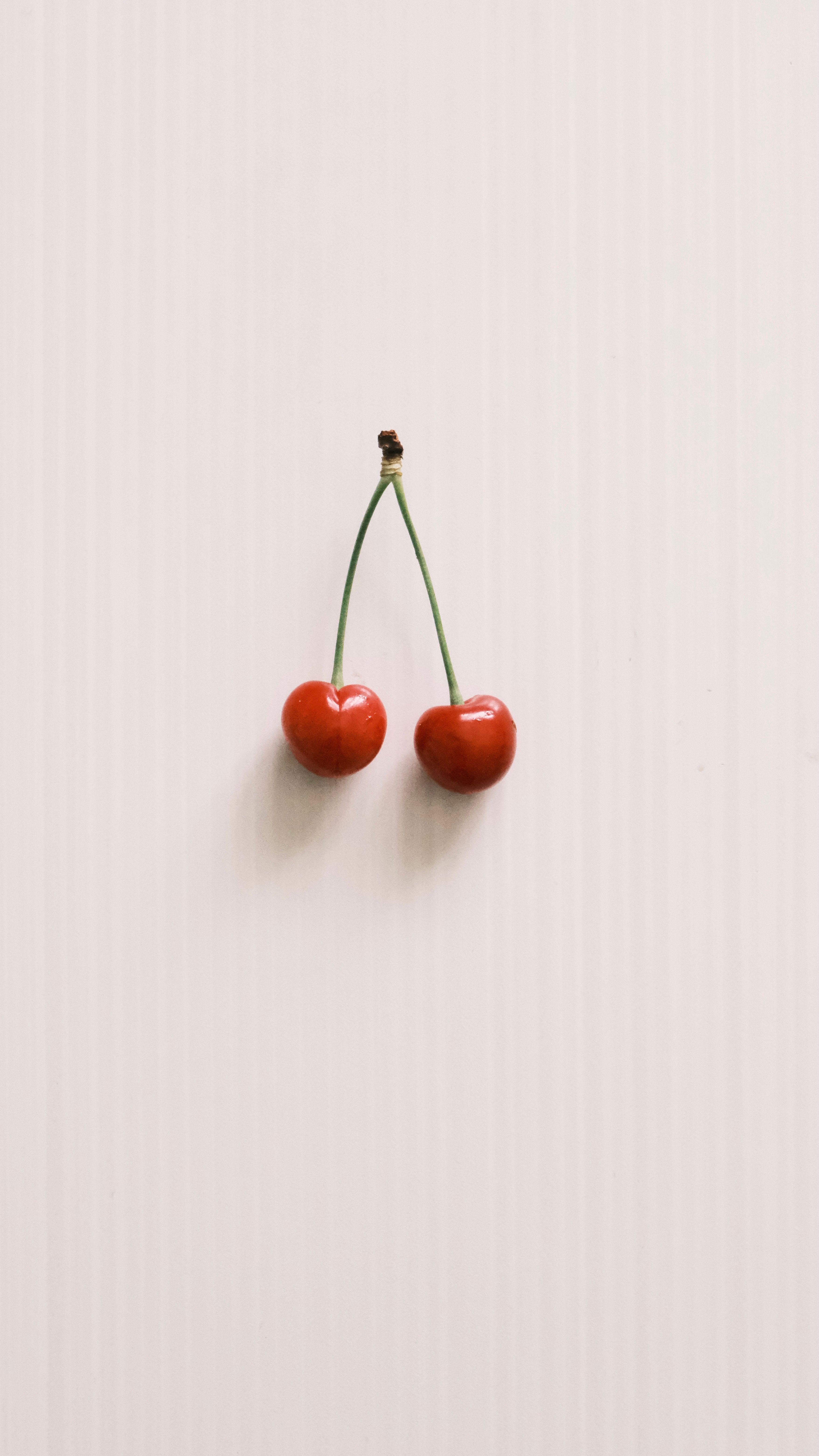 Close Up Photography of a Red Cherry Fruit · Free Stock Photo
