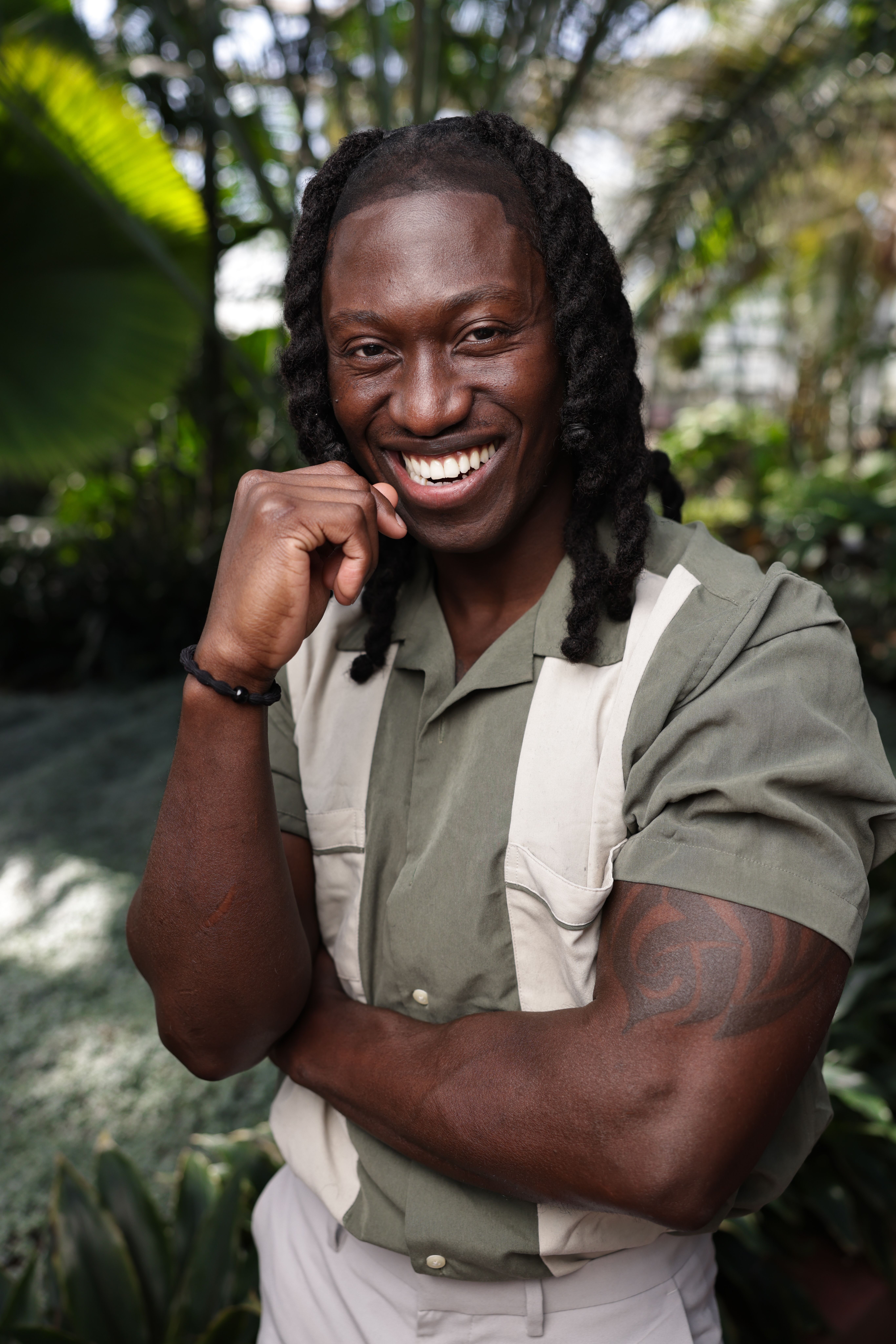 Smiling Muscular Man in Short Sleeved Shirt · Free Stock Photo