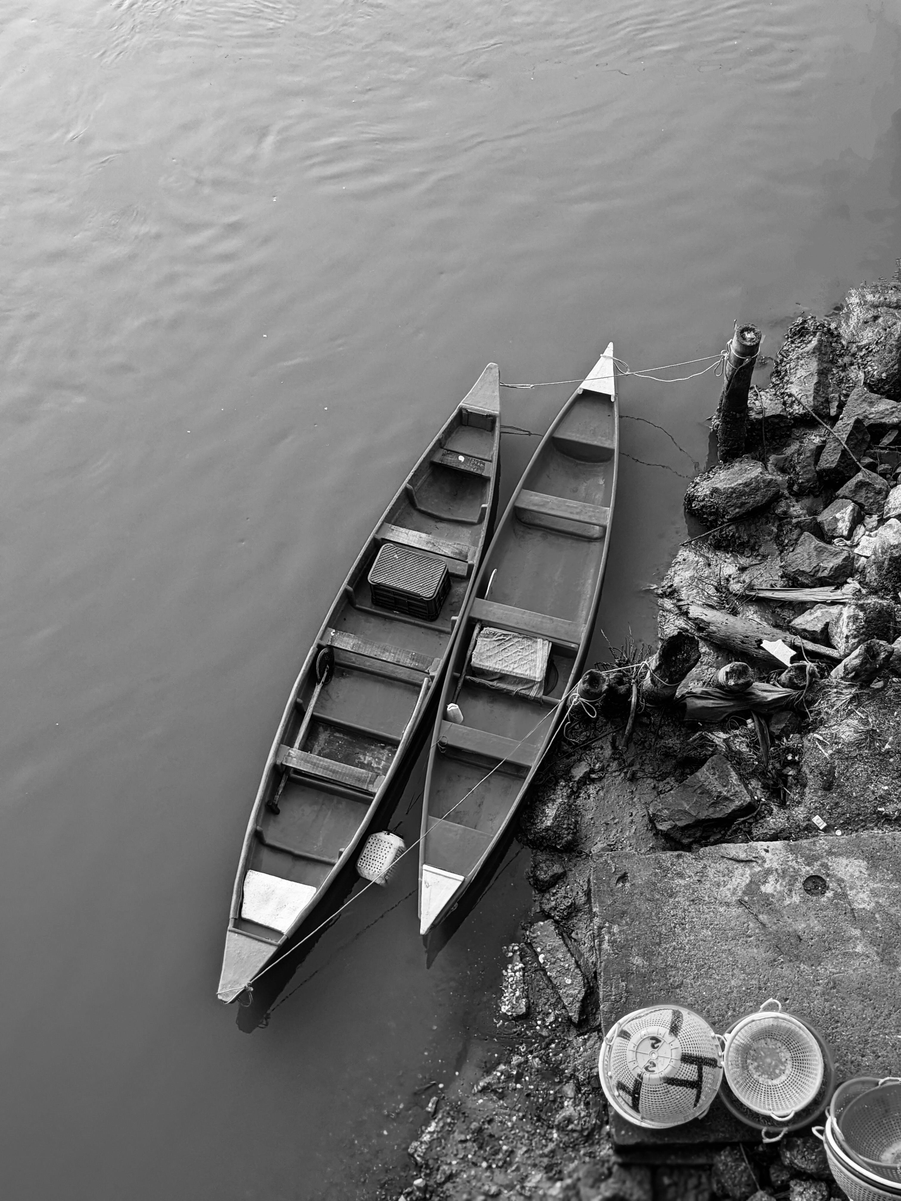 Canoes Decked by Small Rocky Shore · Free Stock Photo