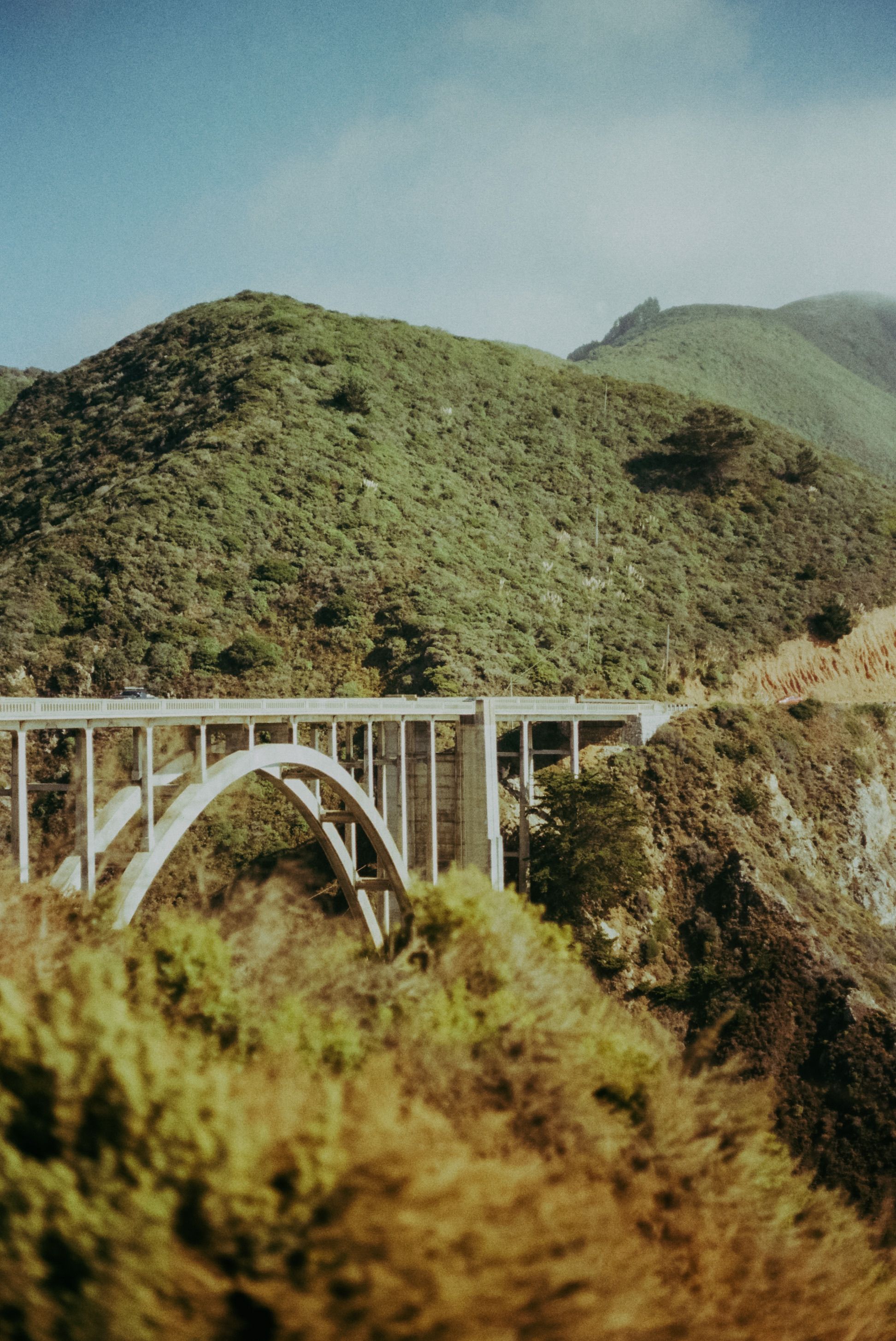 Brown Cliff Near Body of Water · Free Stock Photo