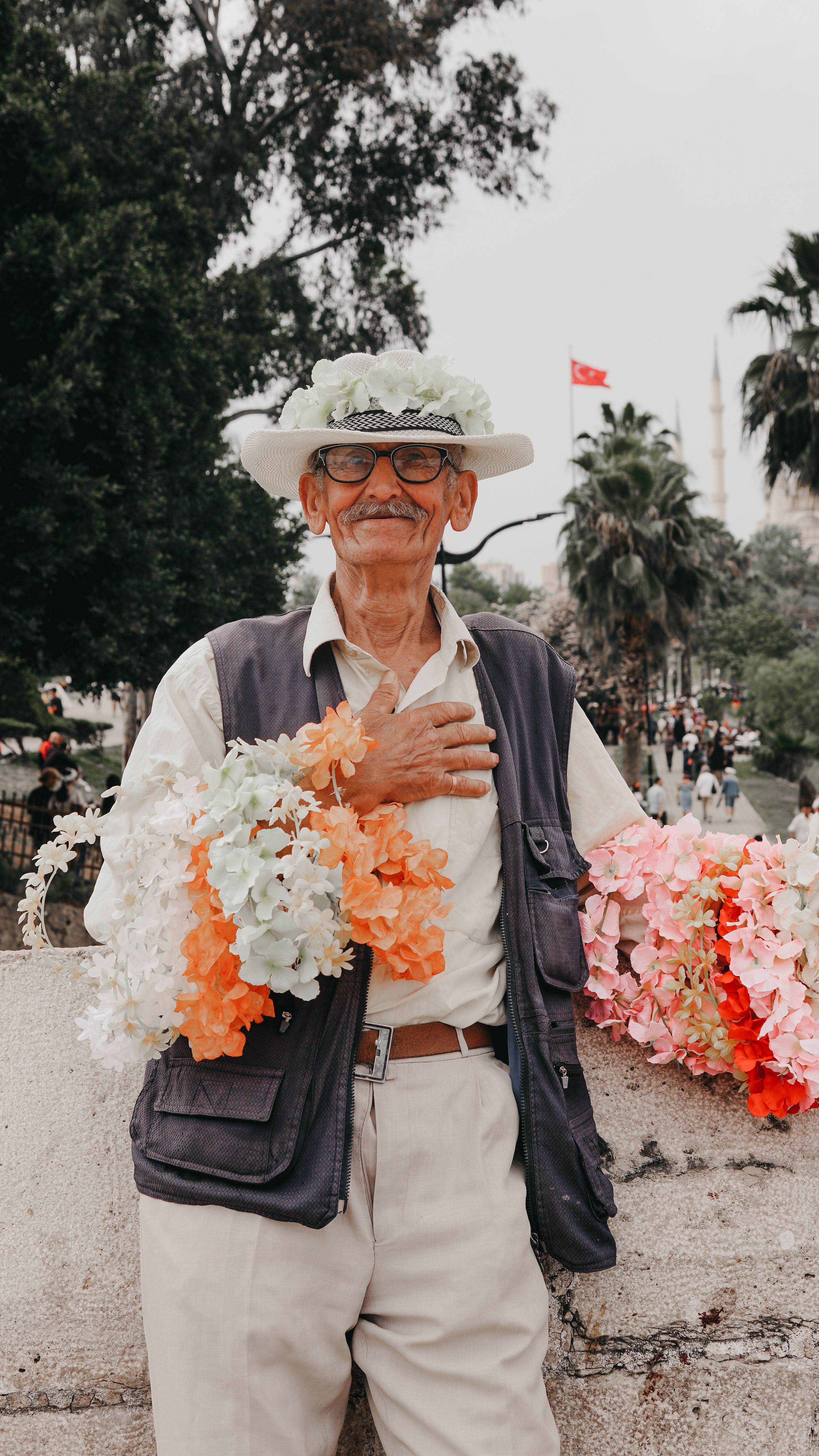Man Selling Flowers on Street · Free Stock Photo