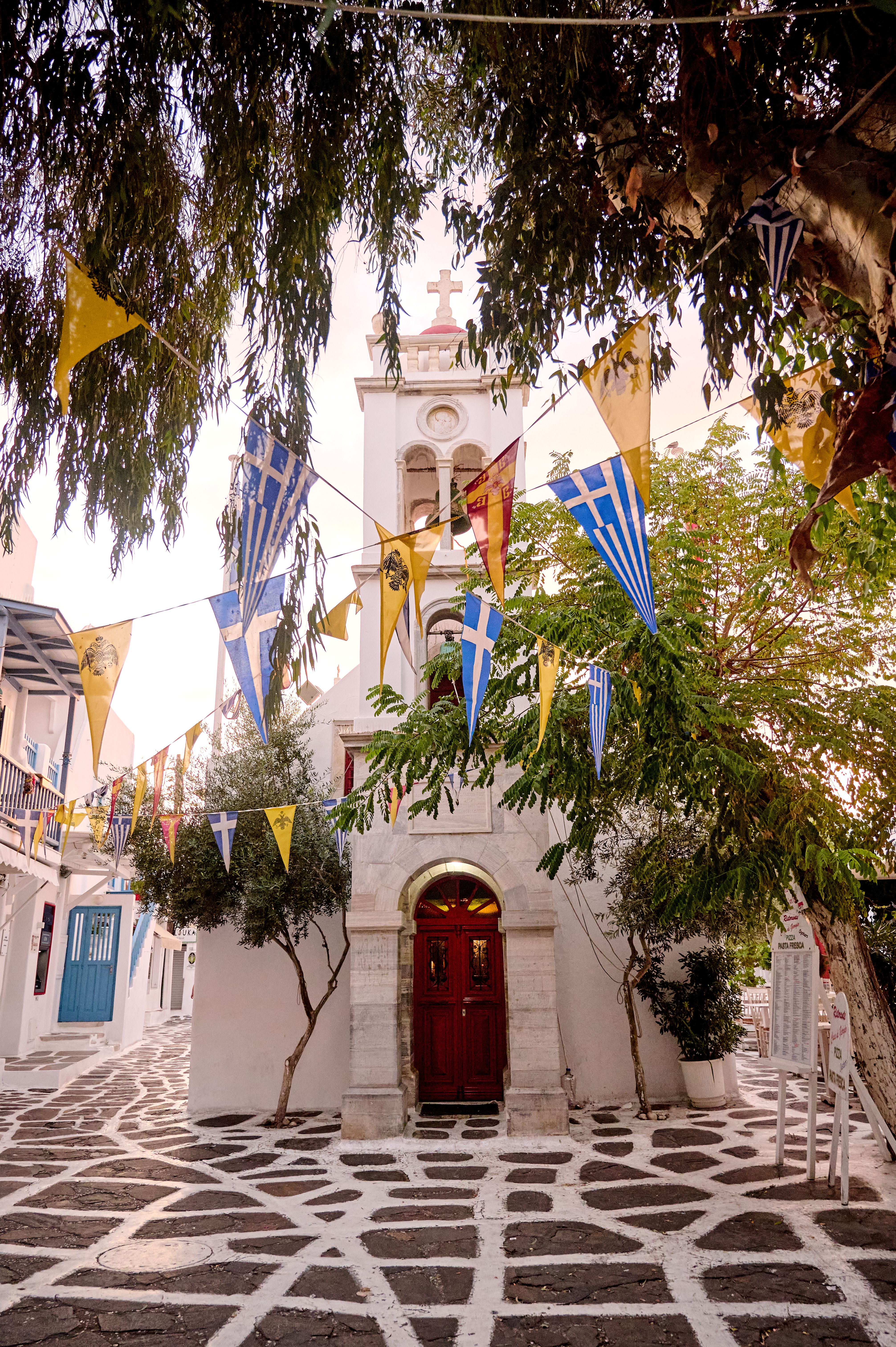 Flags over Street by Church in Mykonos, Greece · Free Stock Photo