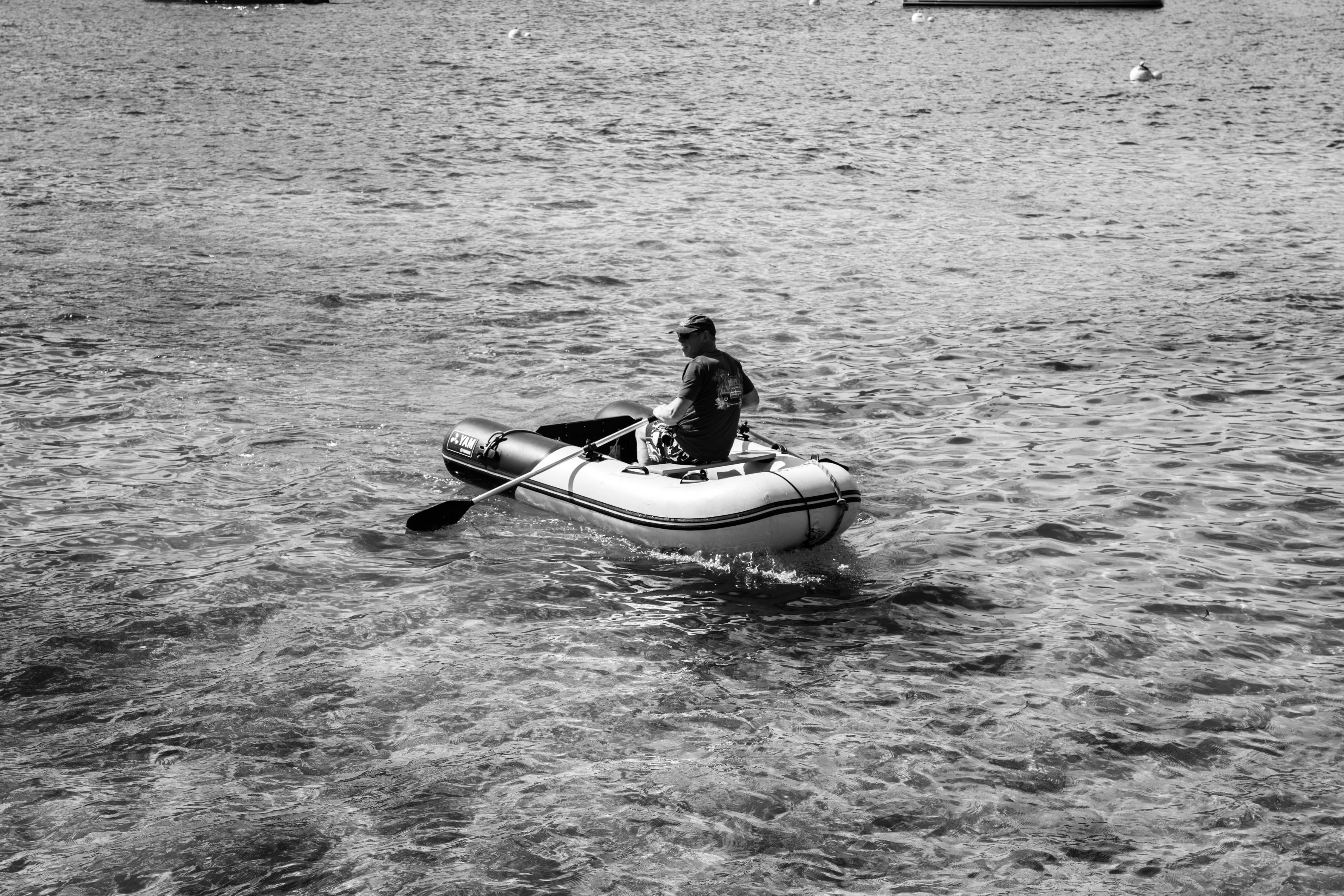 Man in Inflatable Boat · Free Stock Photo