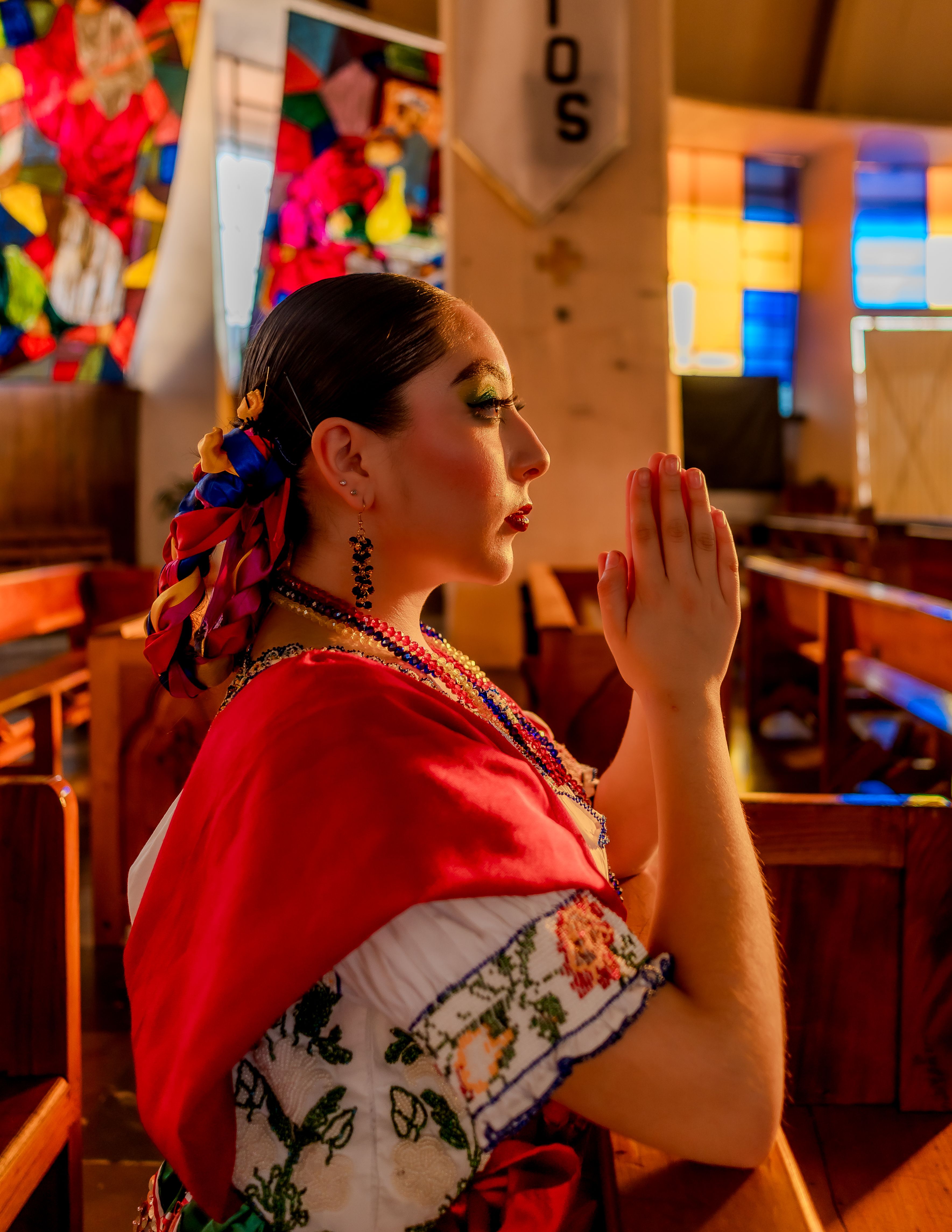 Woman in Traditional Mexican Clothing Praying in a Church · Free Stock ...