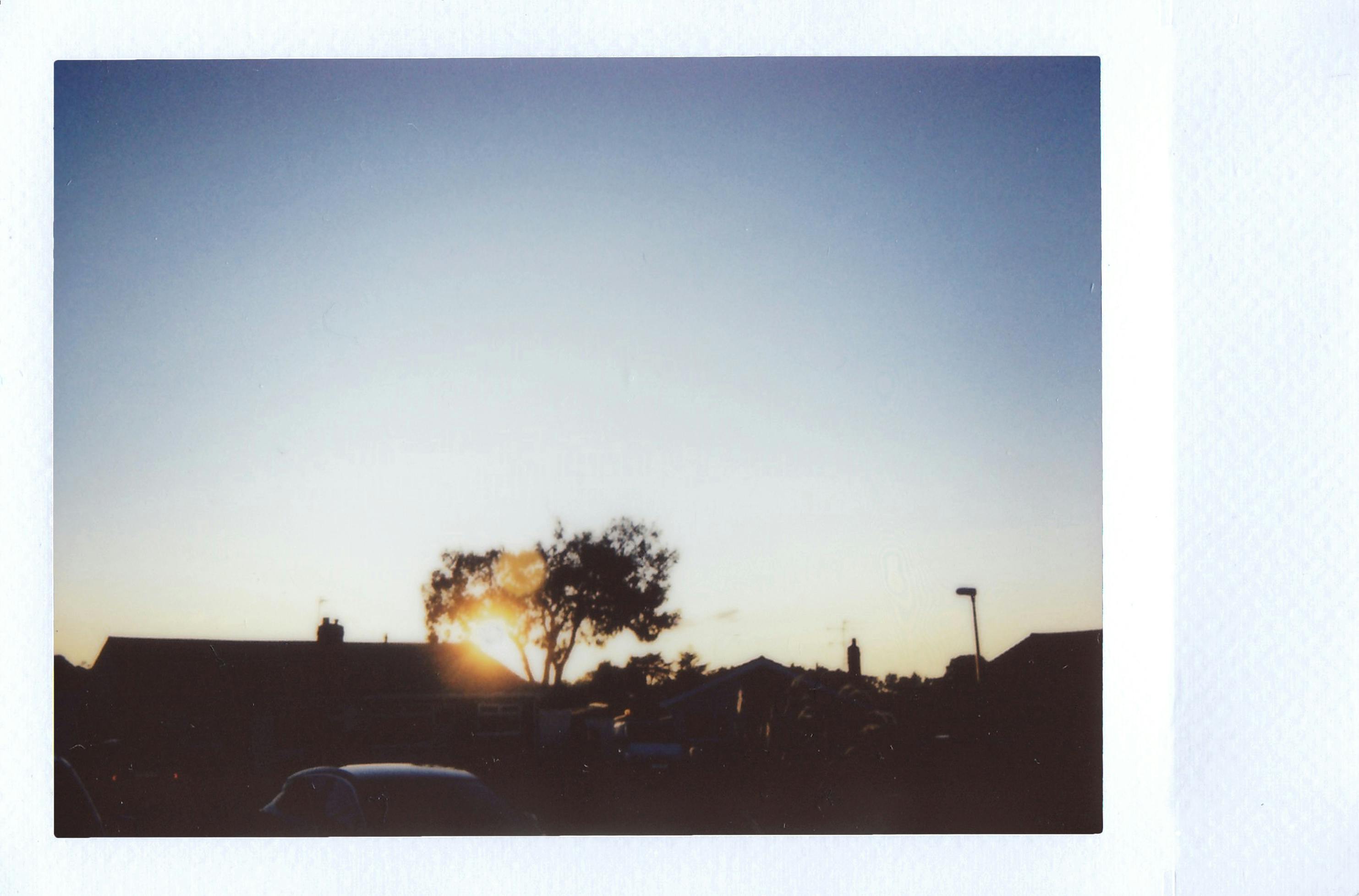 View Of Sunset Above Houses · Free Stock Photo