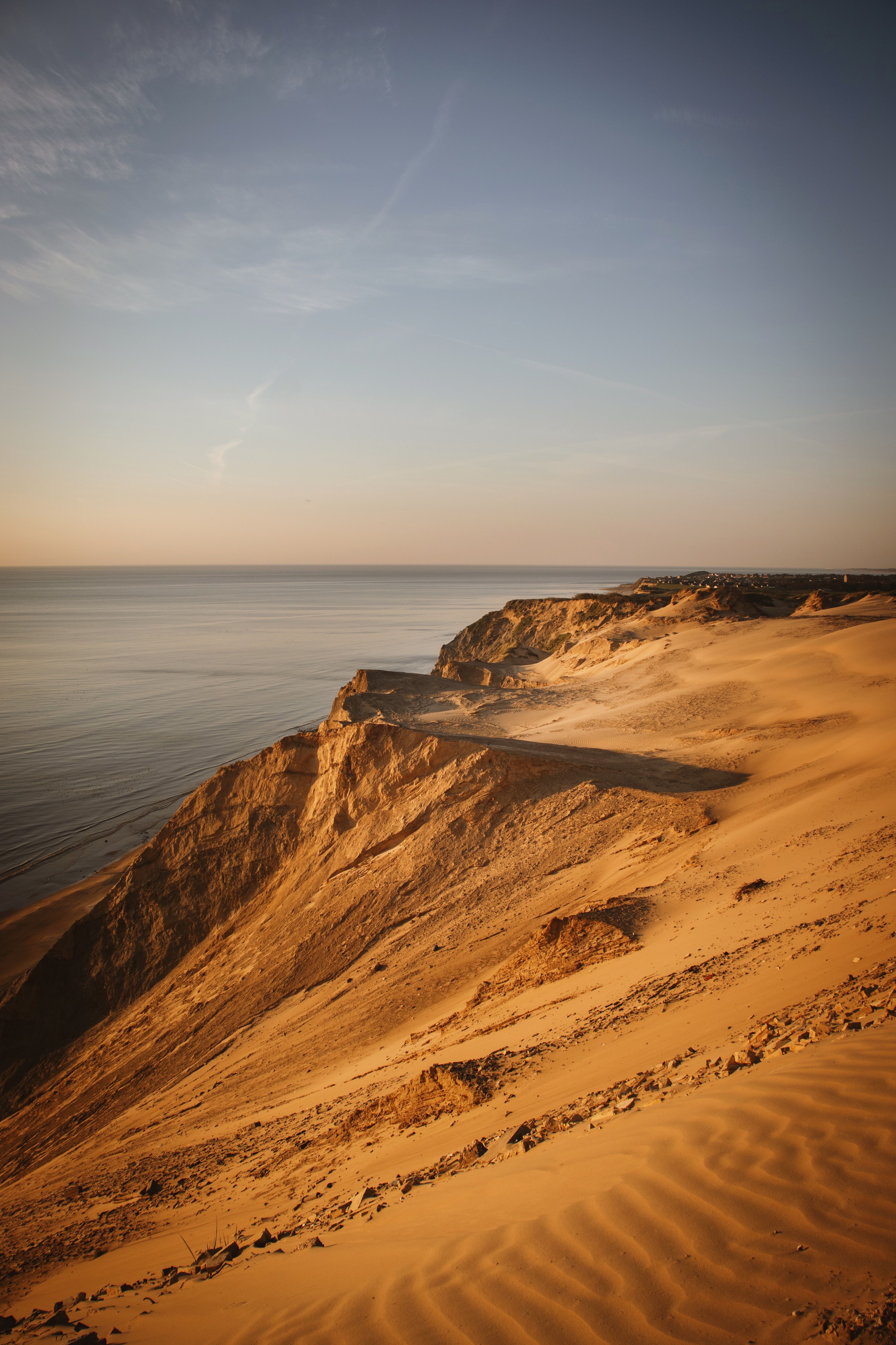 Arid Desert on a Hill by a Sea · Free Stock Photo