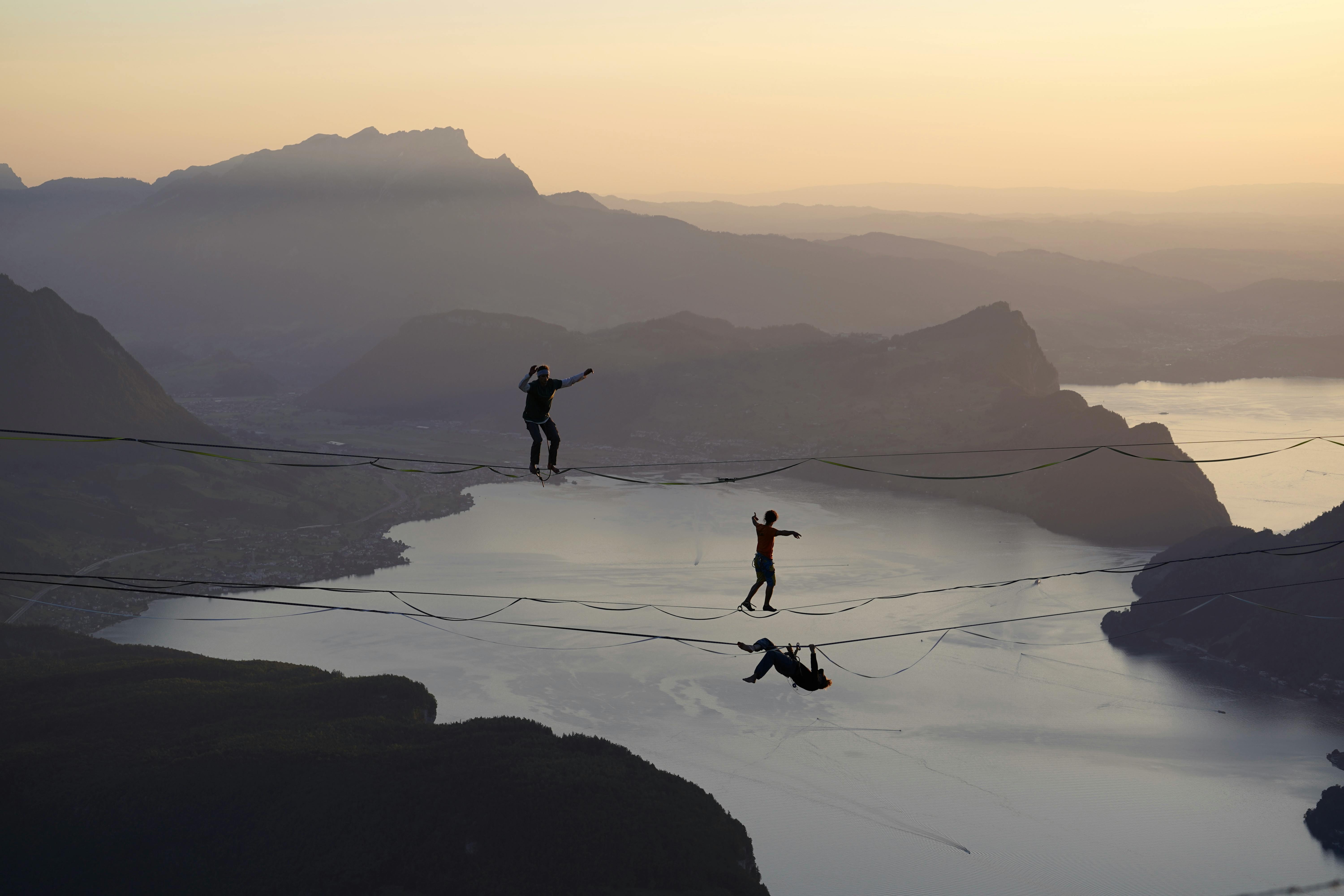 People Walking on Lines at Sunset · Free Stock Photo