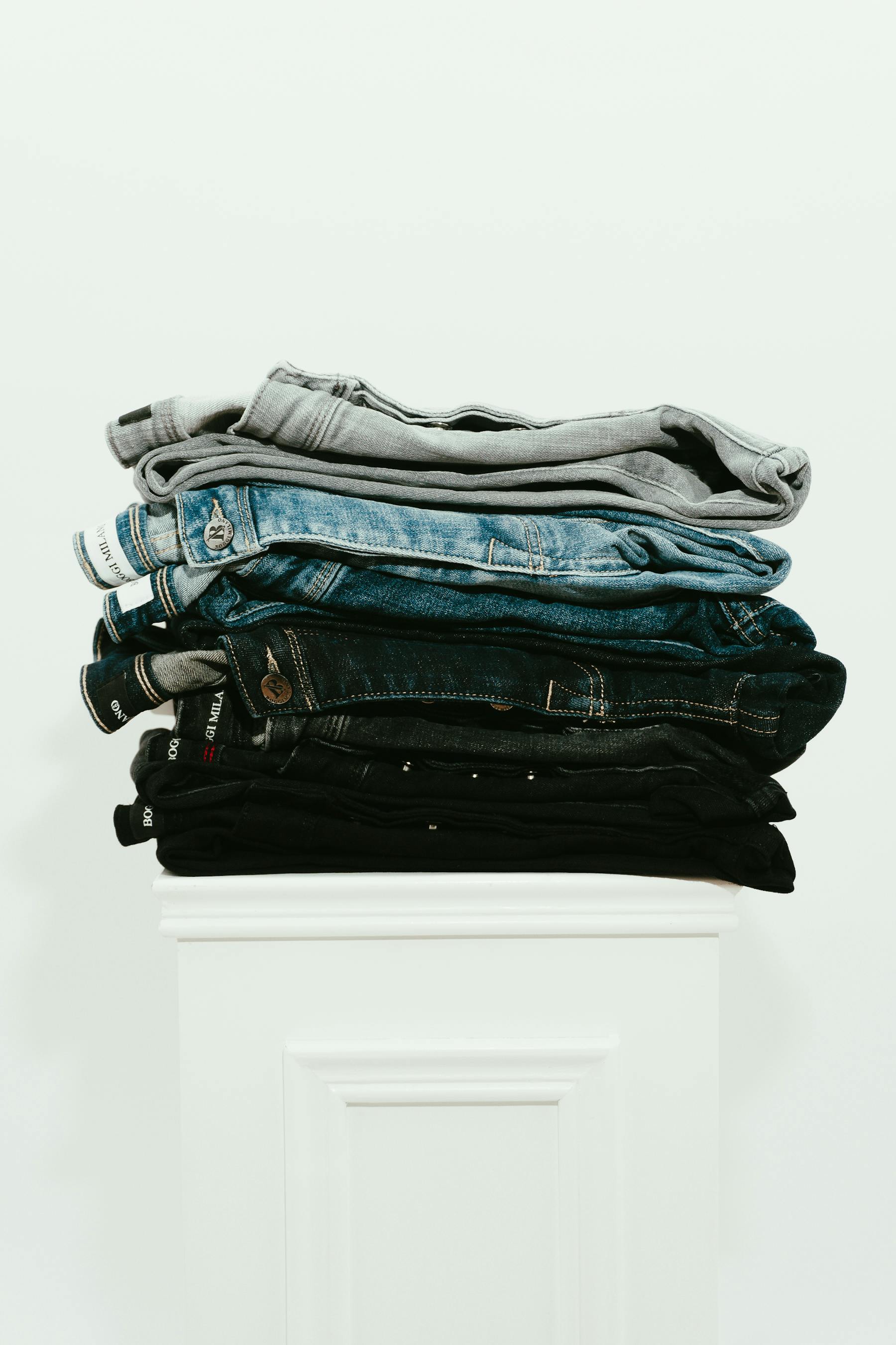 Pile of Denim Blue Jeans · Free Stock Photo