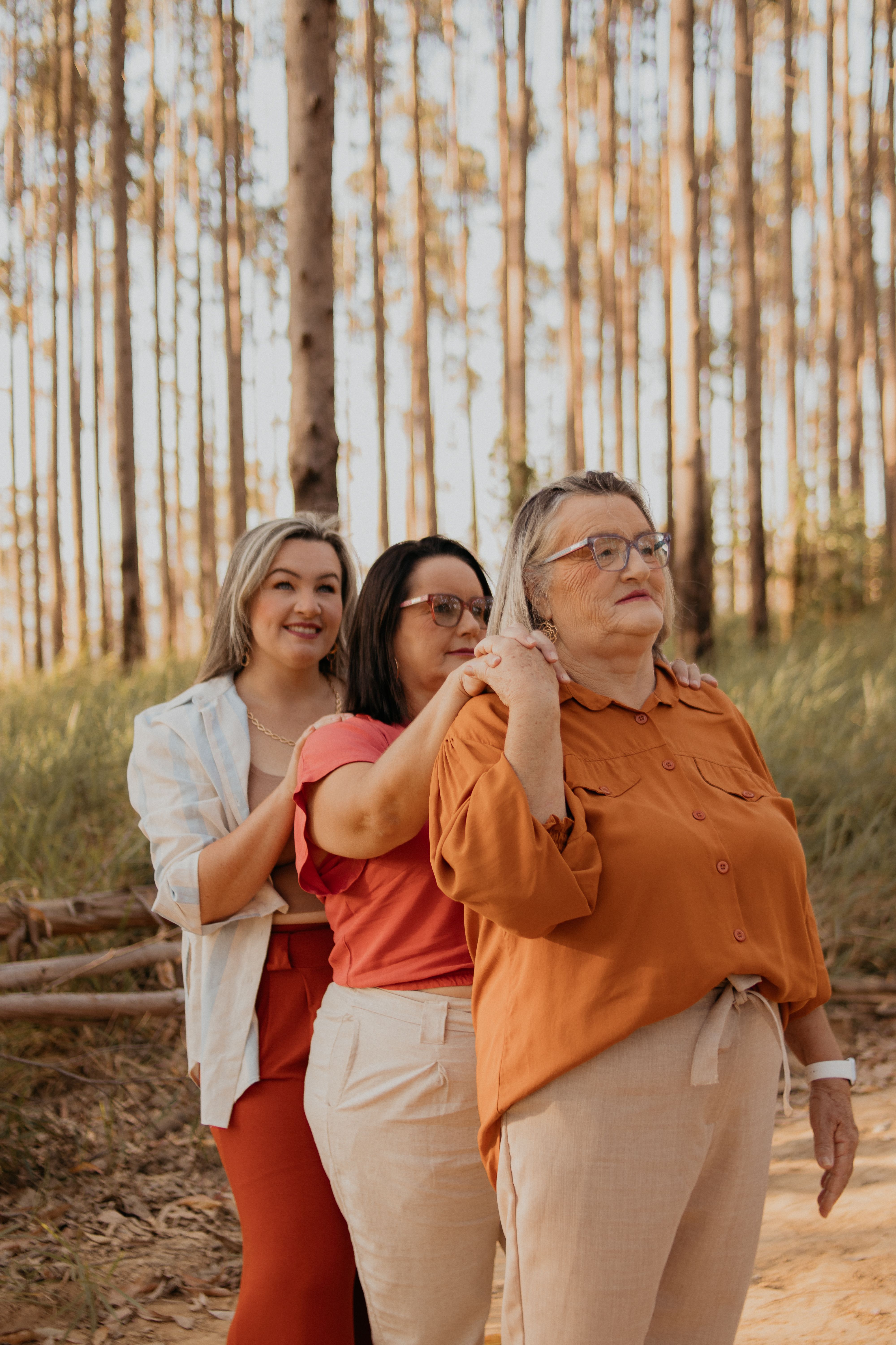 A Group of Women Standing Together in a Forest · Free Stock Photo