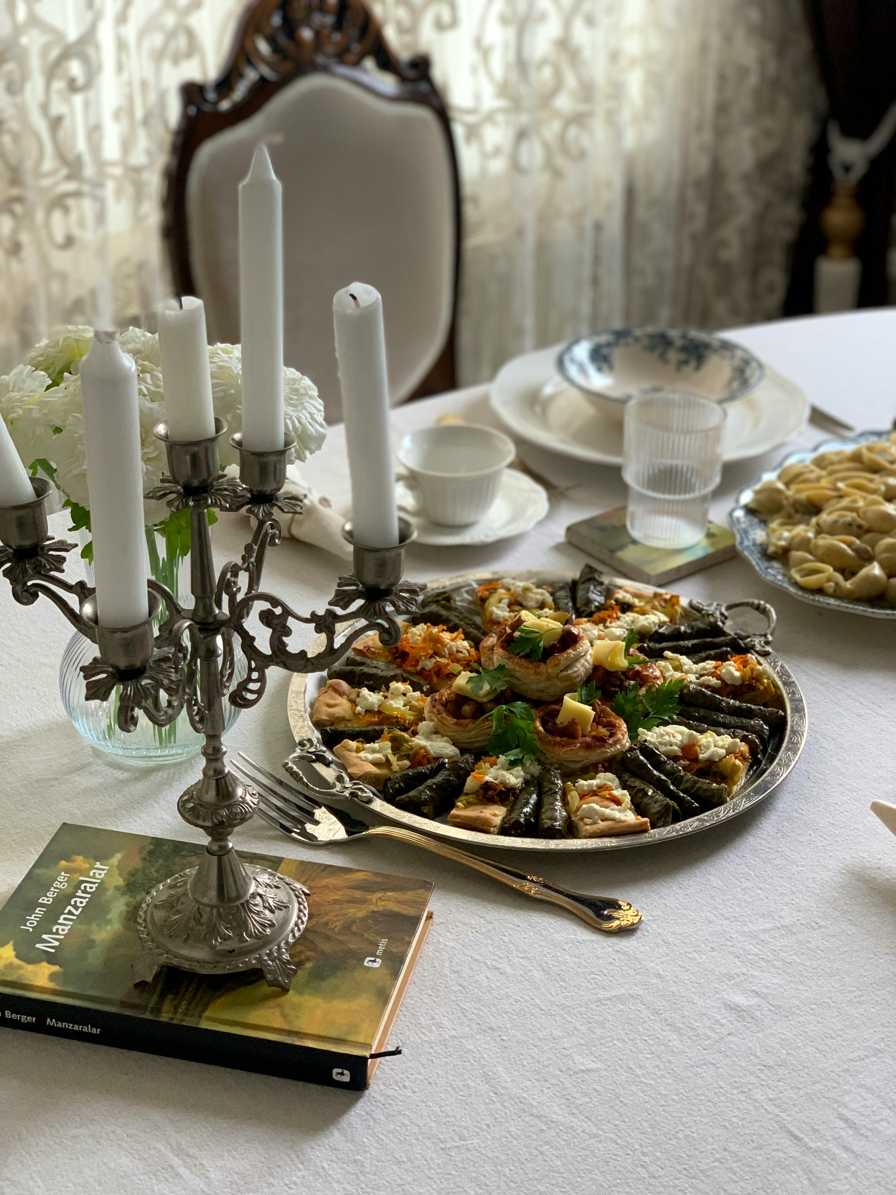 Traditional Dishes Served on Table with Elegant Tableware and Silver ...