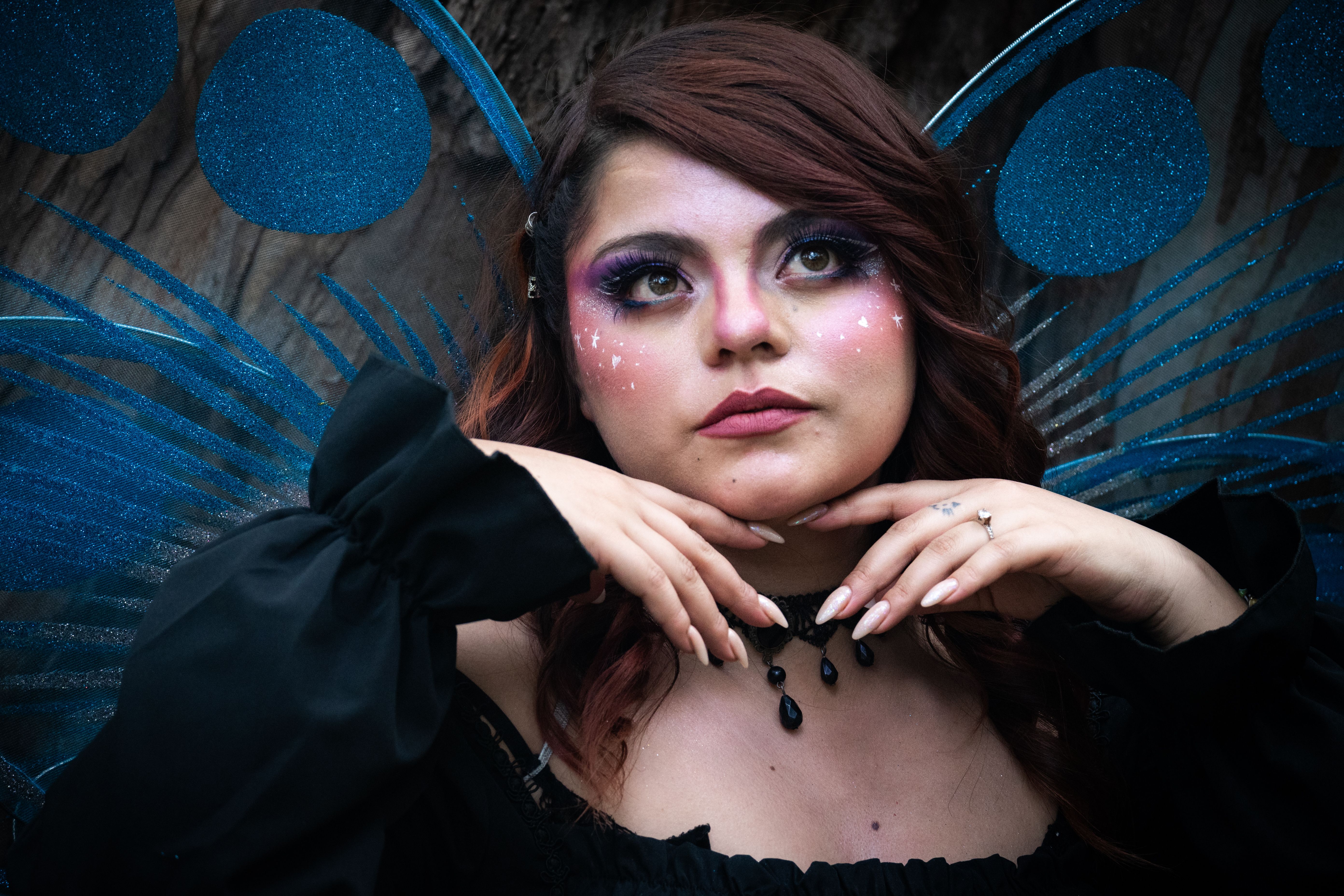 Portrait of Woman with Butterfly Wings · Free Stock Photo