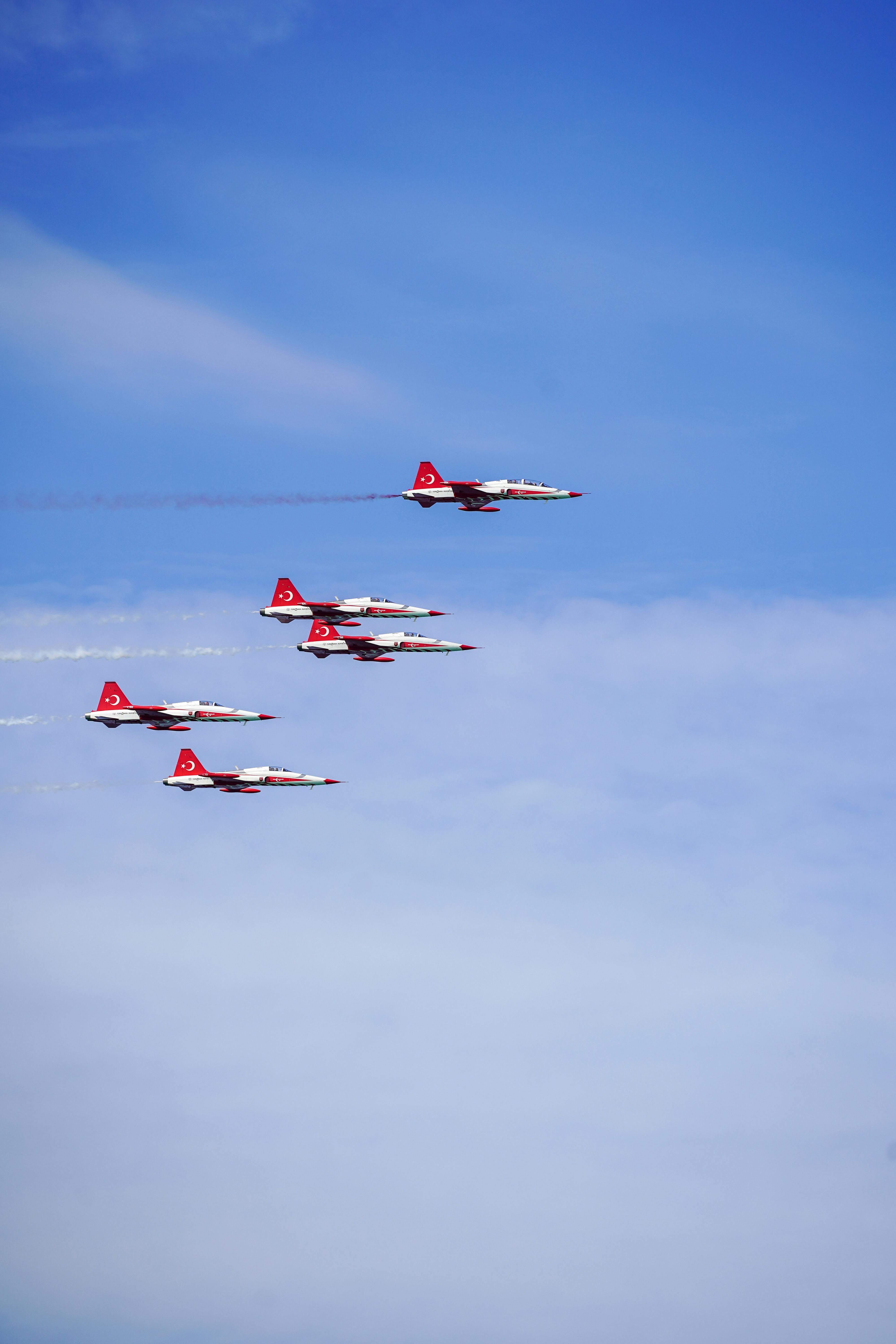 Red Jet Fighter Planes With Assorted Colors of Smoke on Horizon · Free ...
