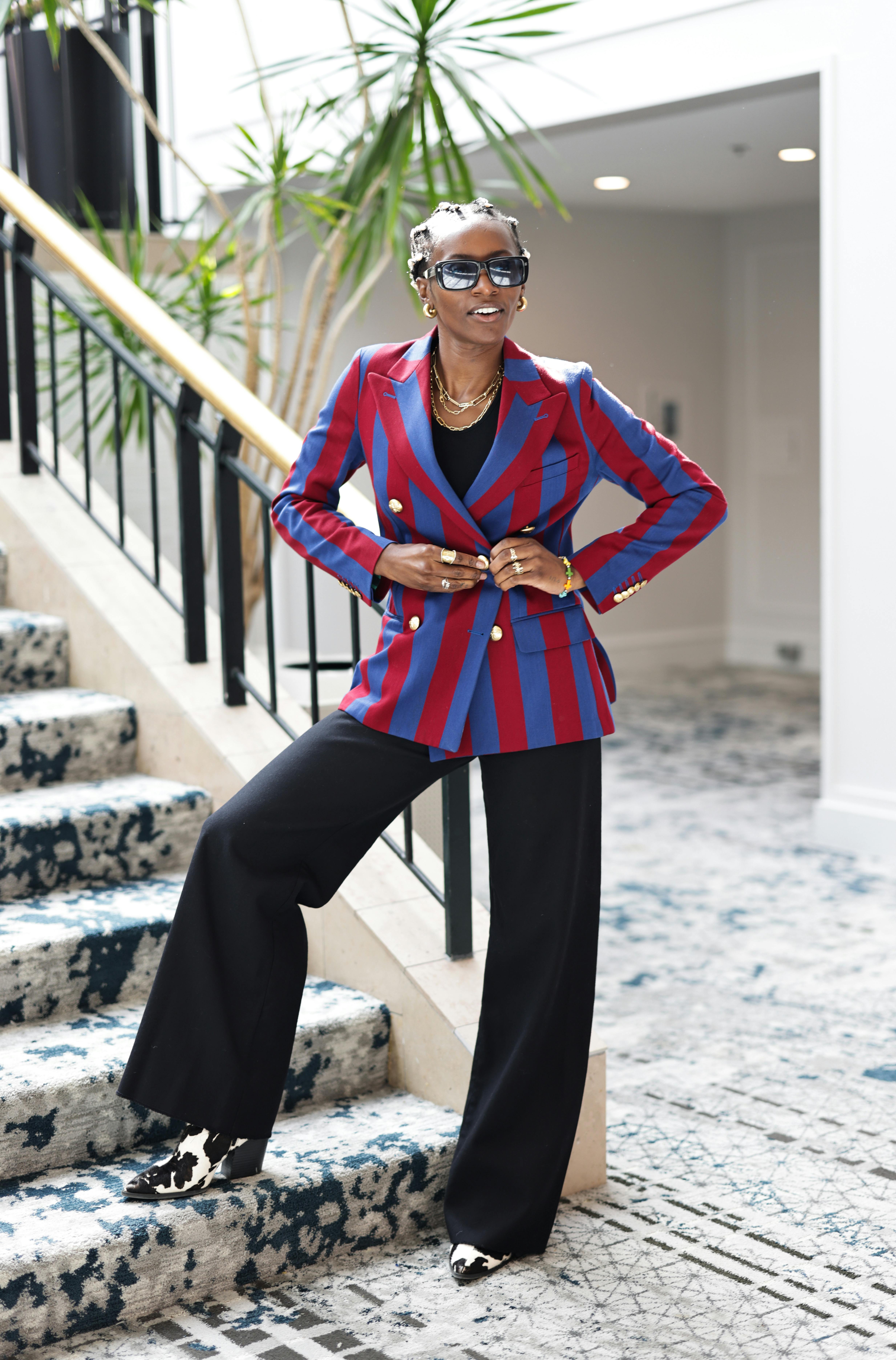 Woman in a Red and Blue Striped Jacket · Free Stock Photo