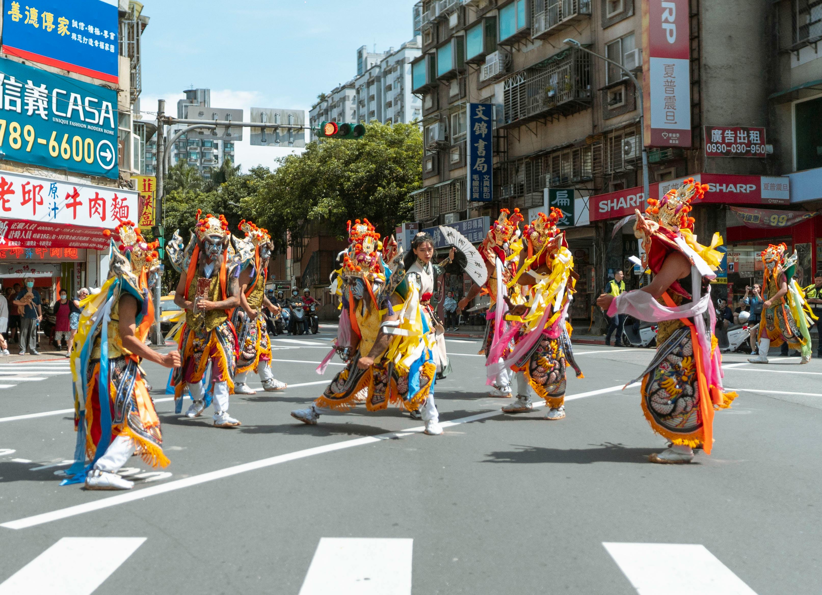 Chinese Street Parade with People in Costumes · Free Stock Photo