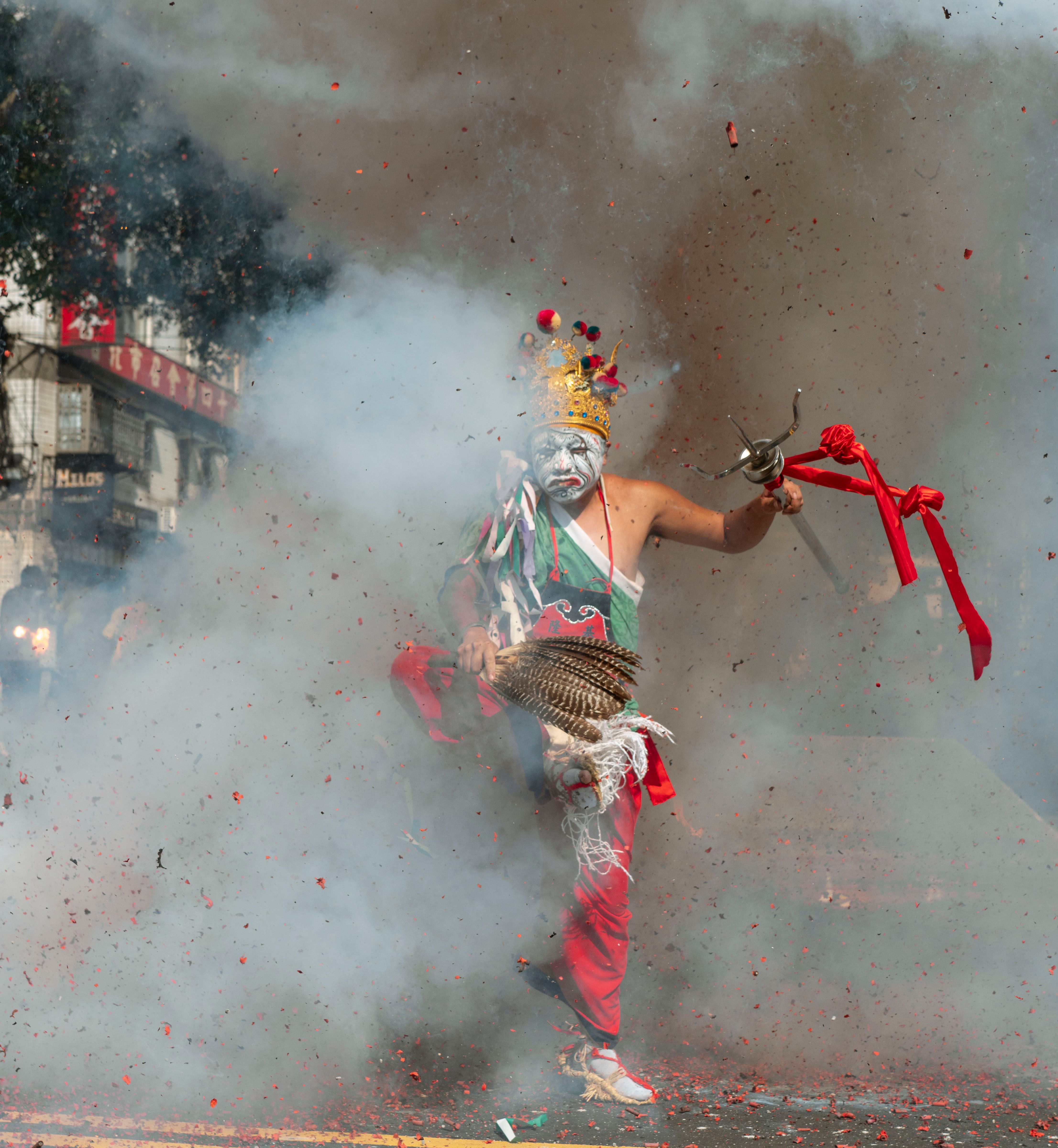 Dancer in Costume Standing in Smoke on Street · Free Stock Photo
