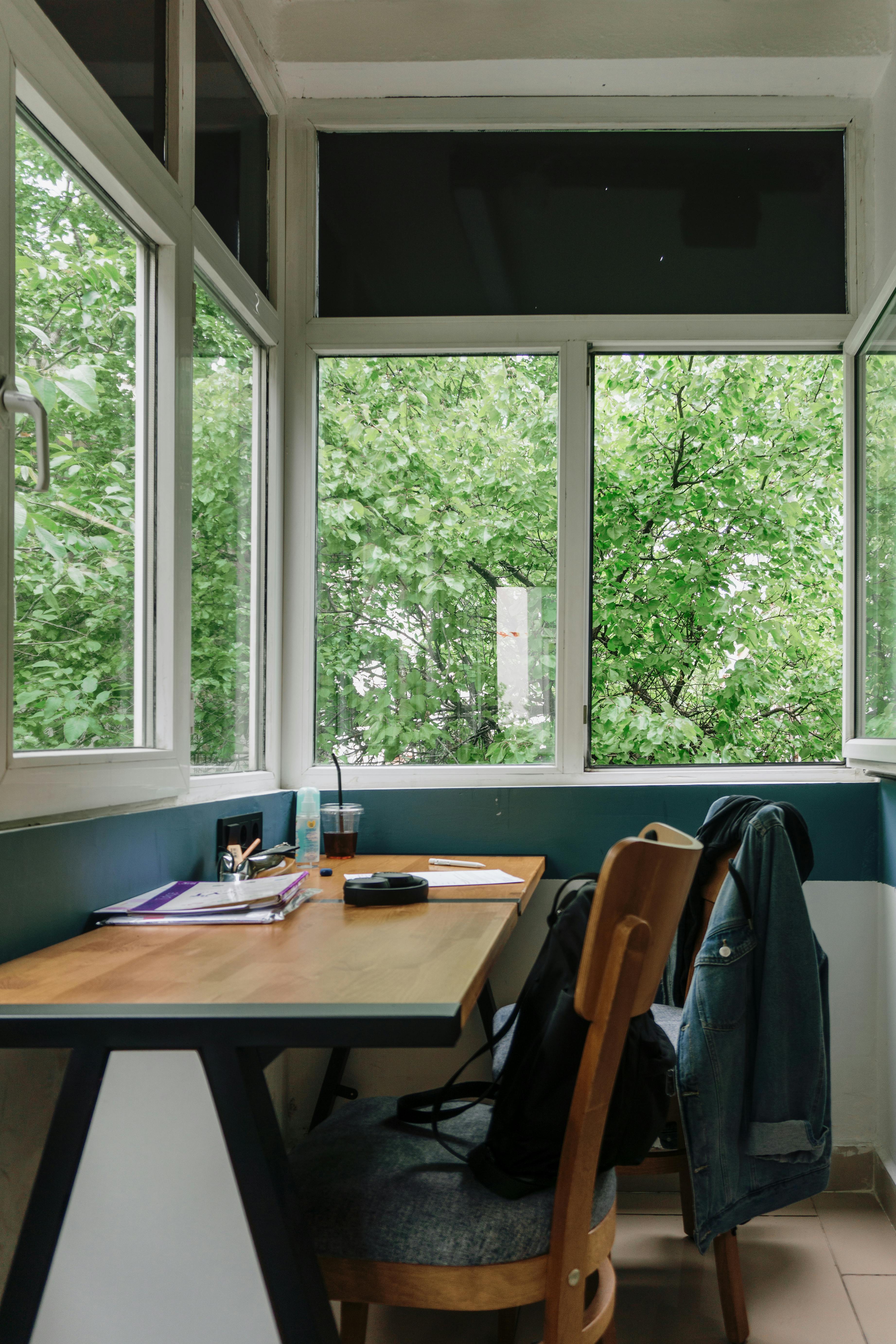 Desk and Chairs near Windows · Free Stock Photo