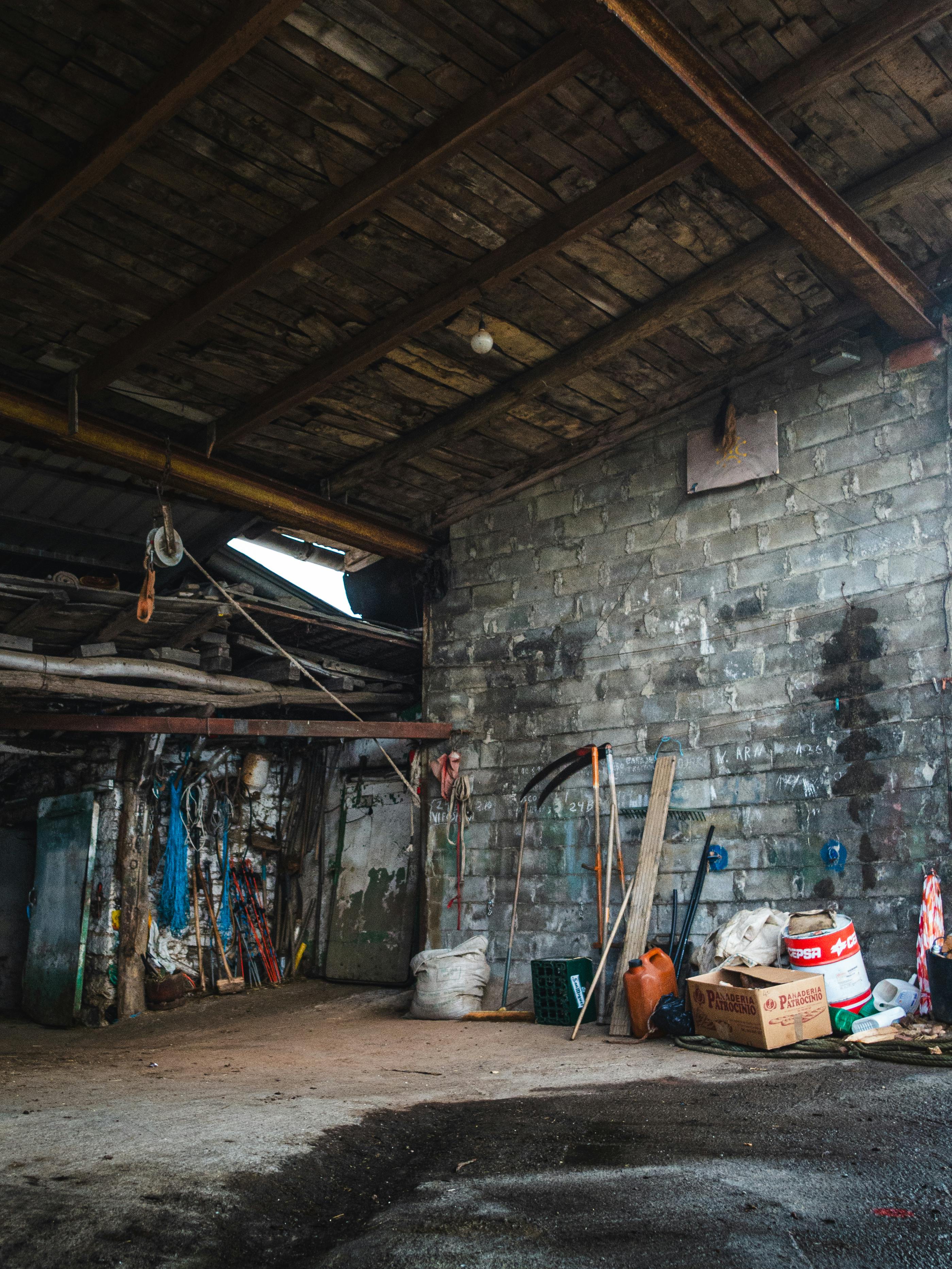 Tools and Containers in an Old Abandoned Building · Free Stock Photo
