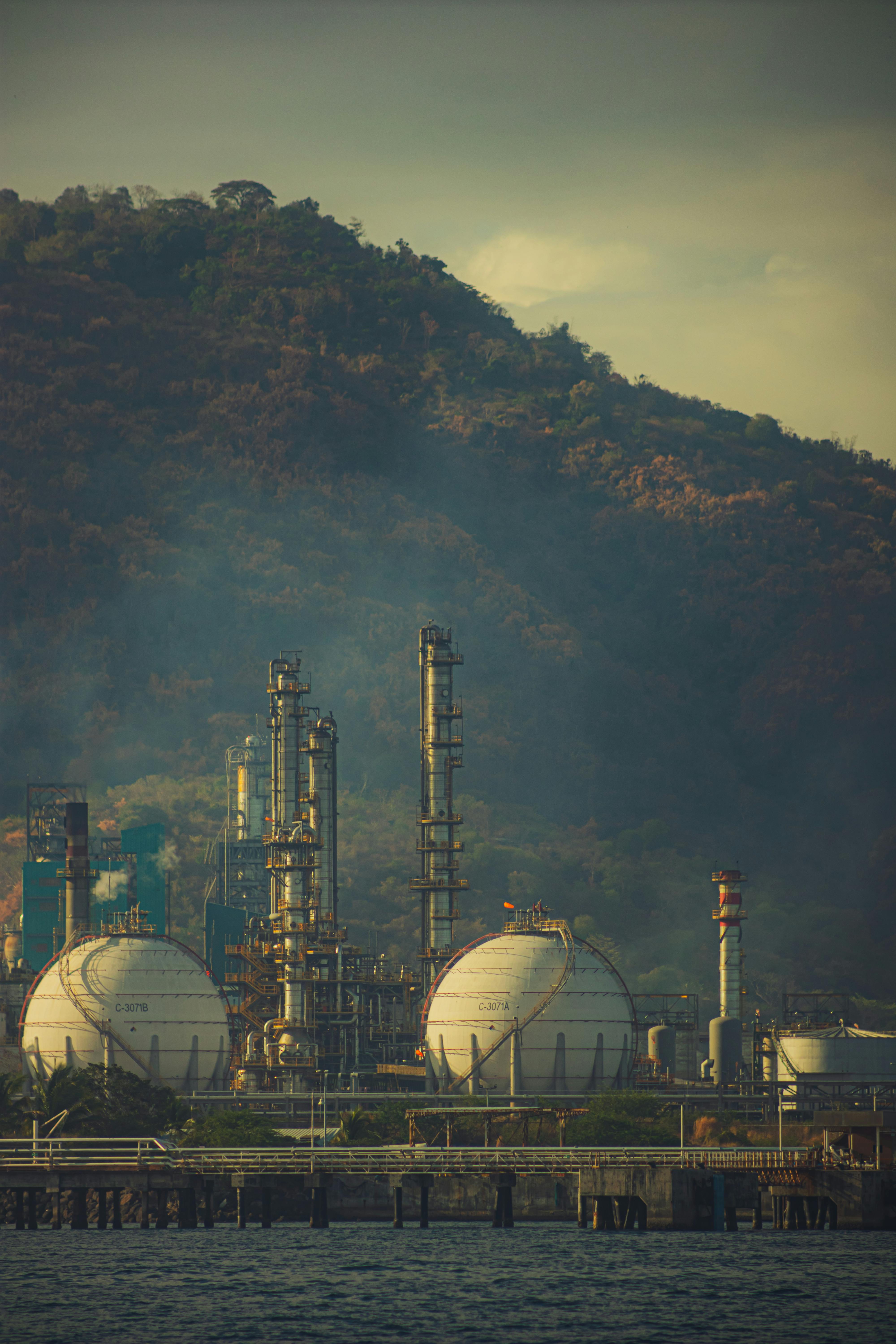 Grayscale Photography of a Factory · Free Stock Photo