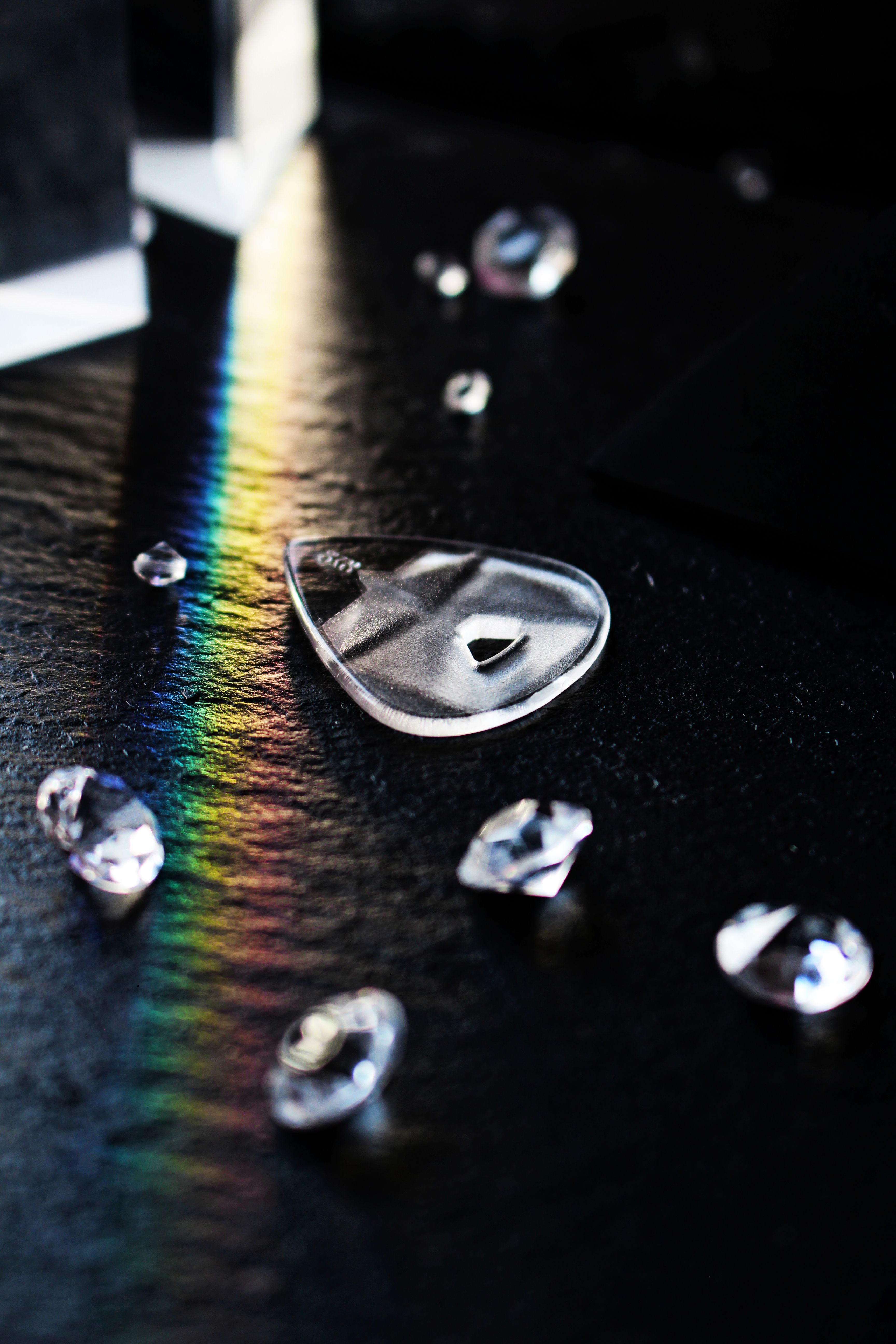 Rainbow Light and Guitar Pick · Free Stock Photo