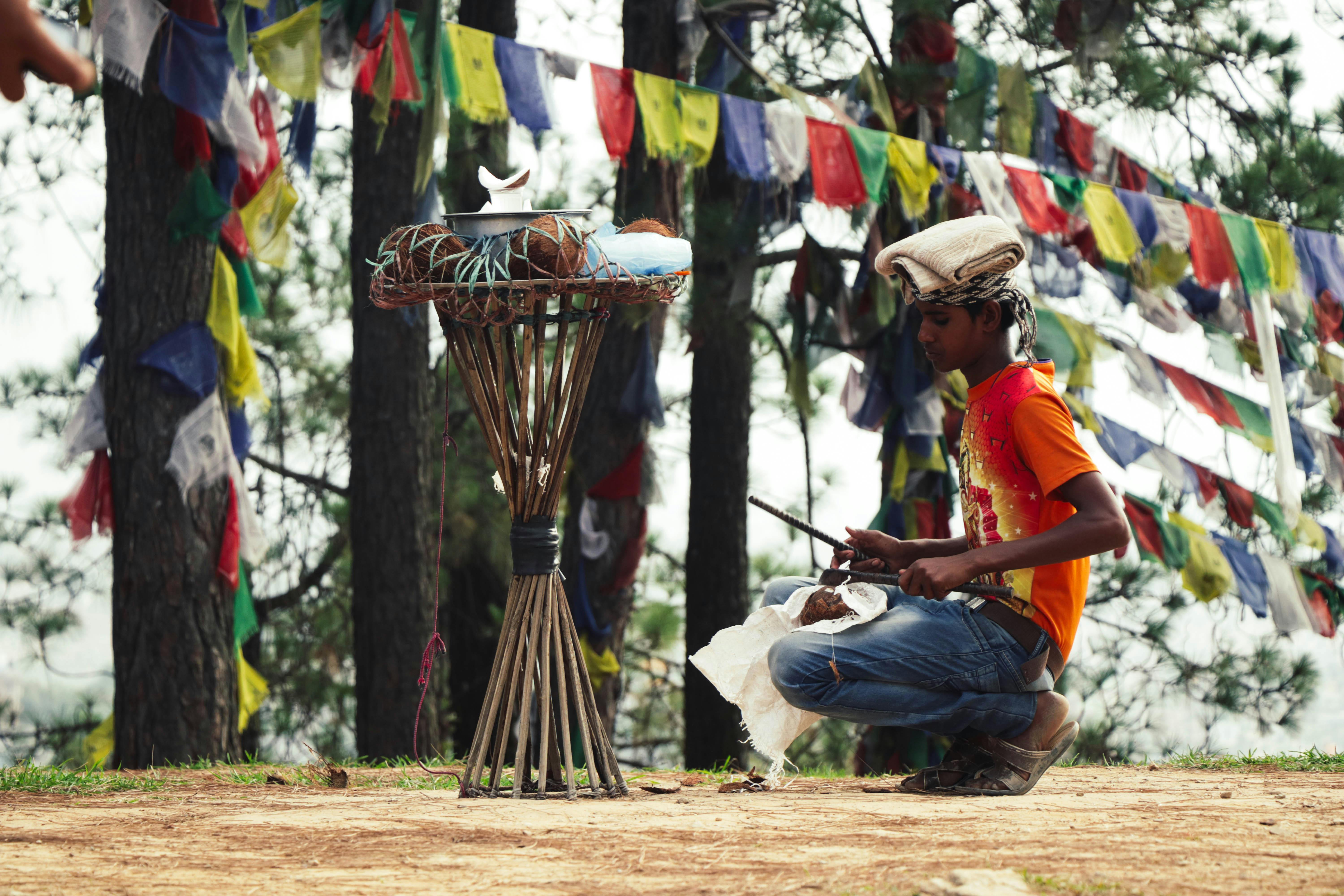Man Wearing Orange Crew Neck Shirt And Blue Denim Jeans · Free Stock Photo