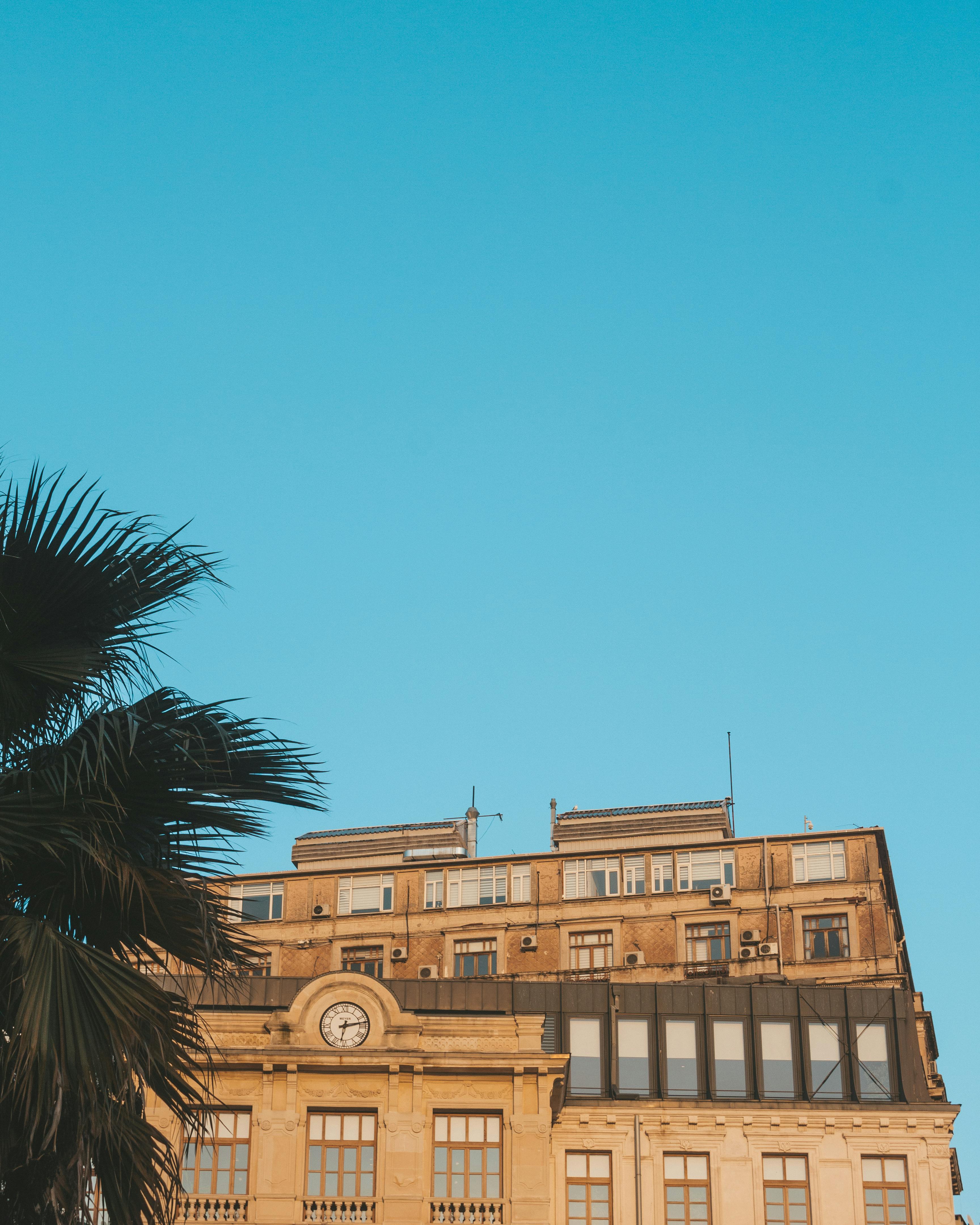 Brown Concrete Building · Free Stock Photo