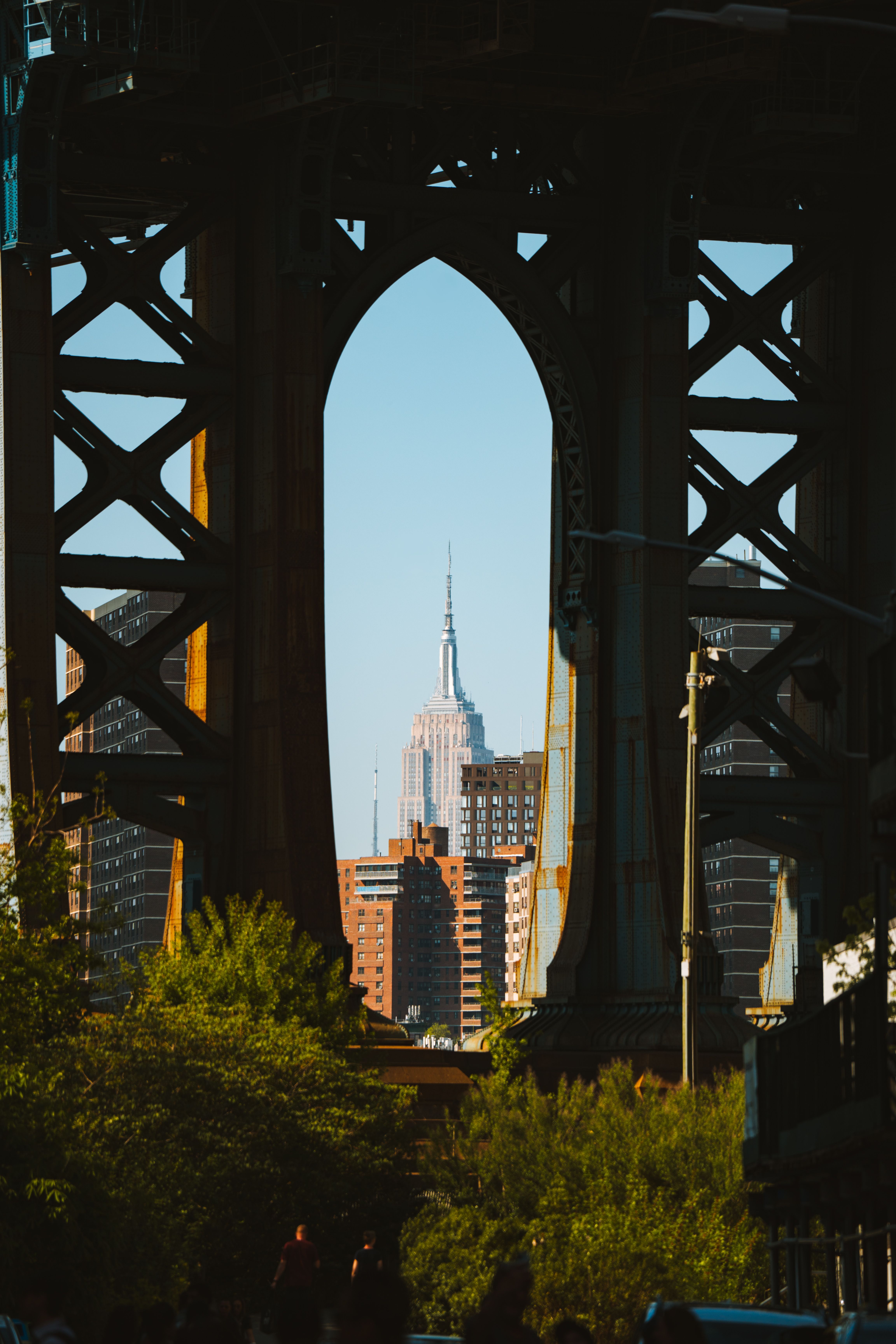 Photo of the Manhattan Bridge with a View of the Empire State Building ...
