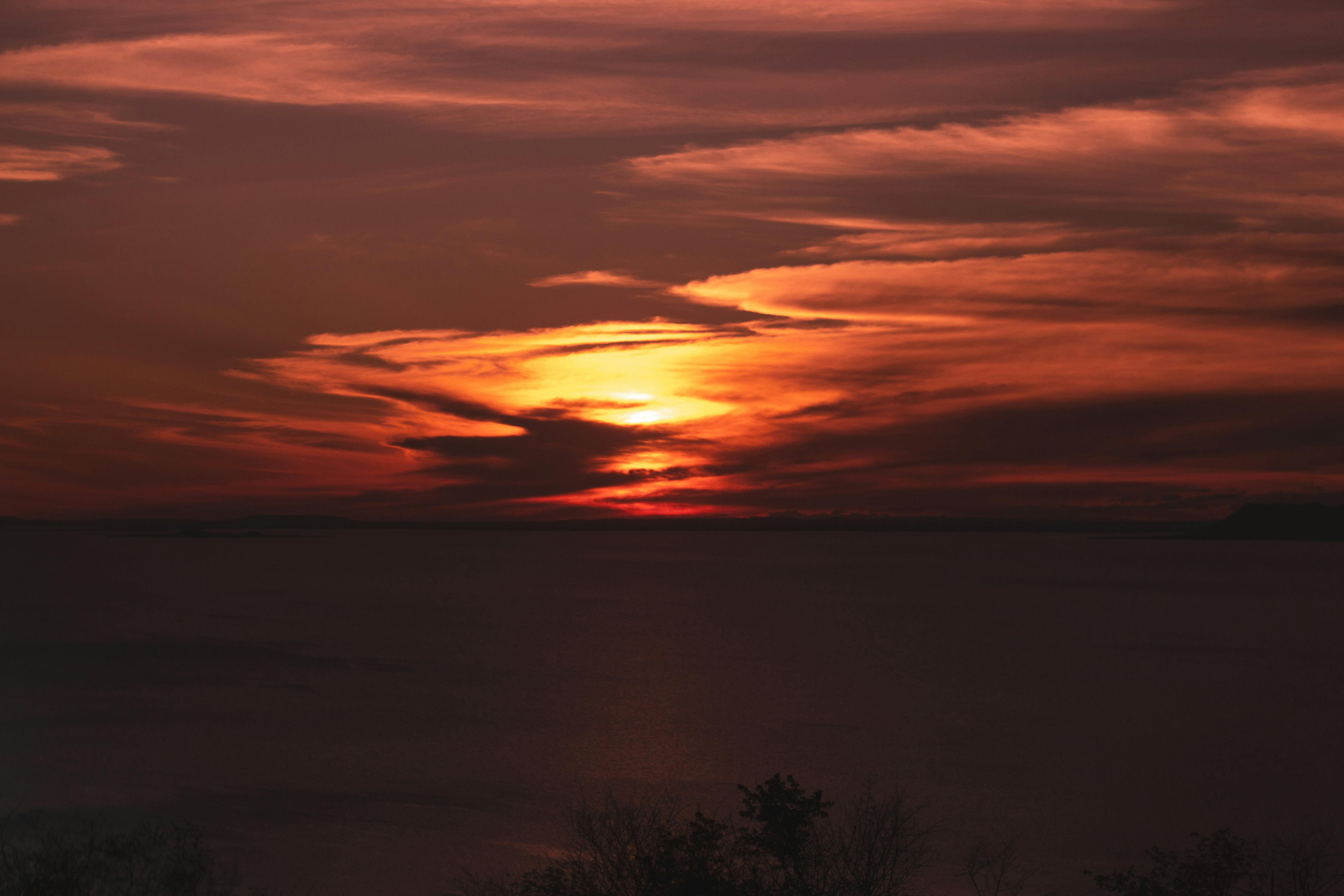 Birds Eye View of Sea Coast at Sunset · Free Stock Photo