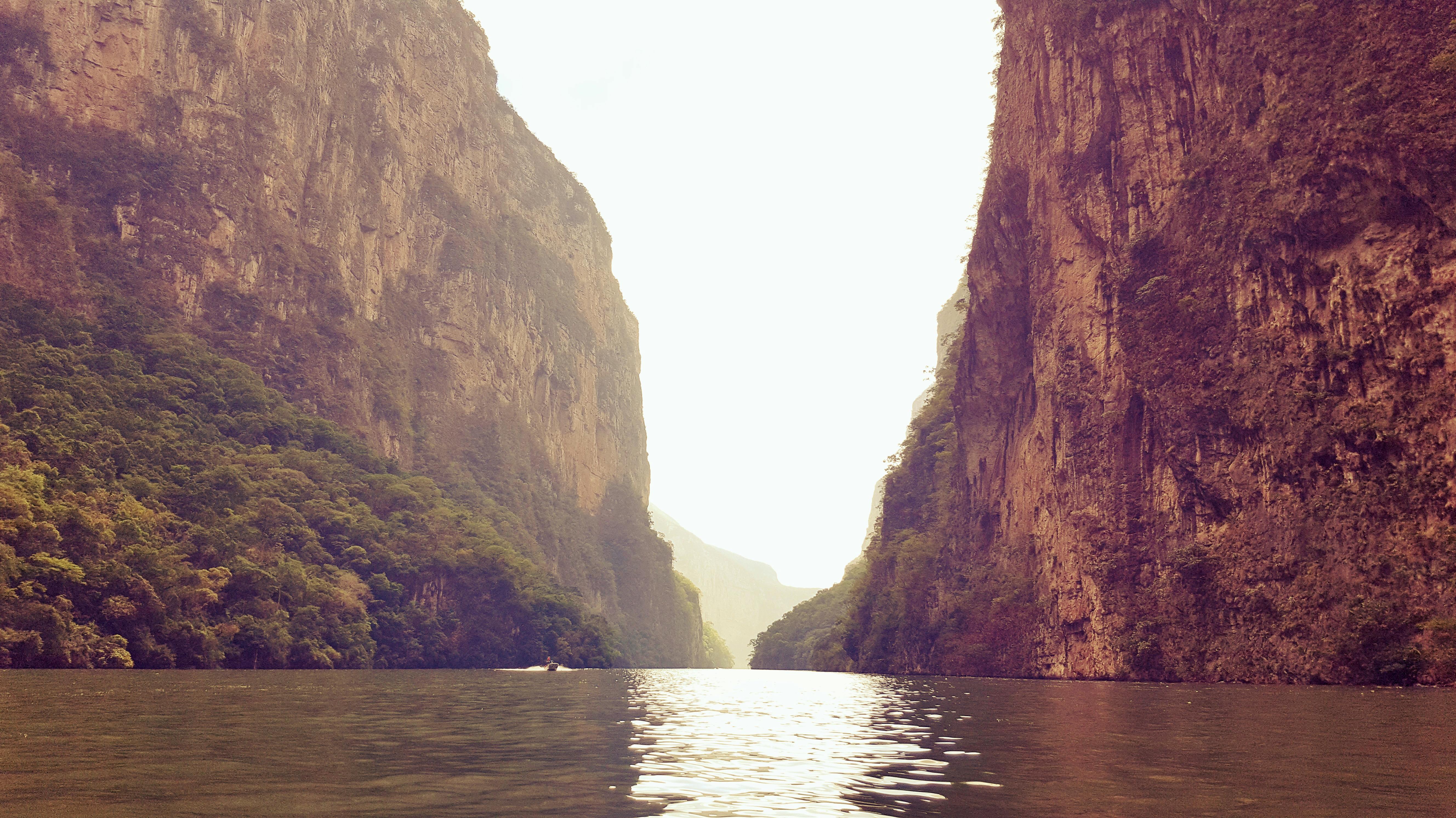 River in a Tall Canyon · Free Stock Photo