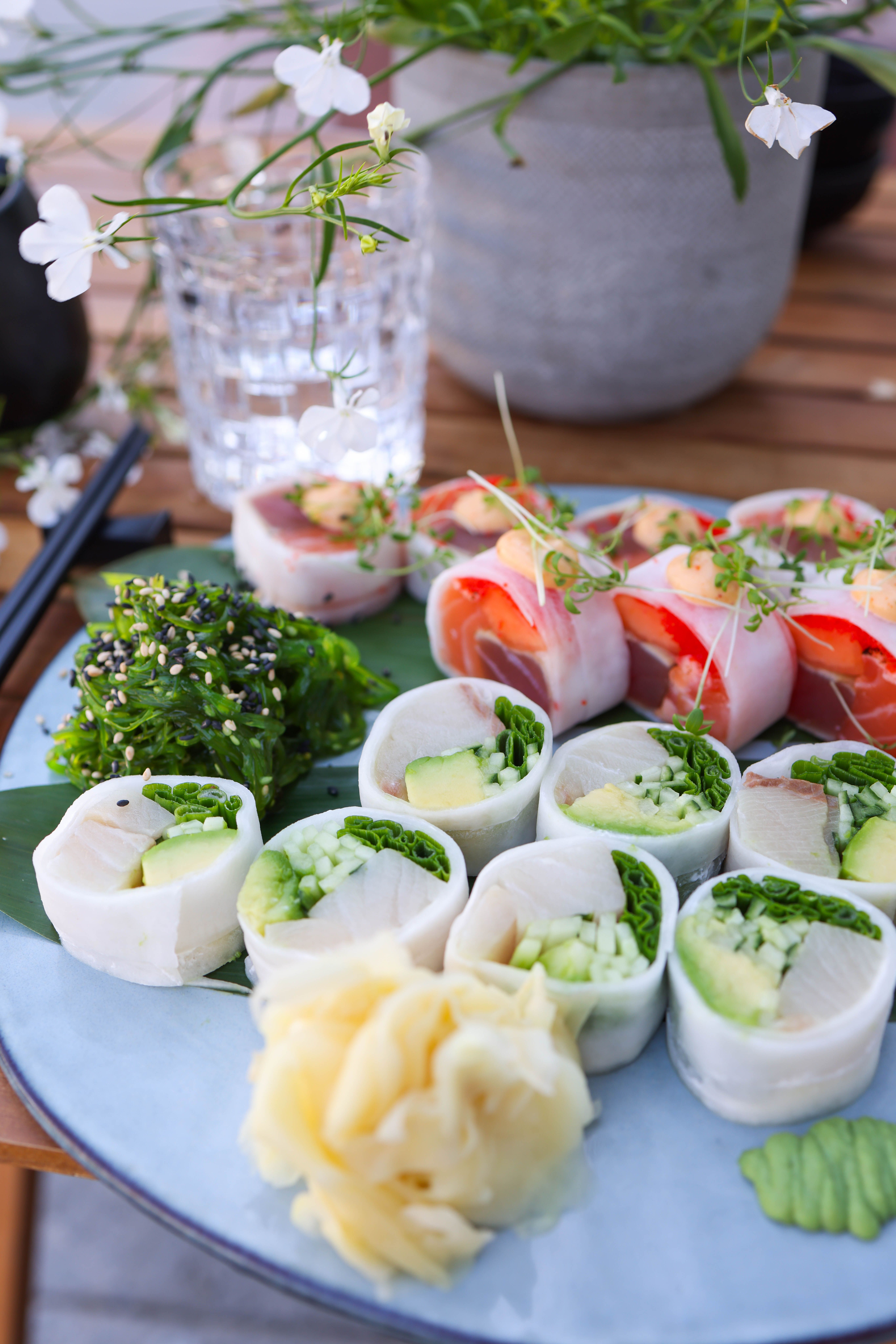 Traditional Sashimi Rolls on a Blue Plate · Free Stock Photo