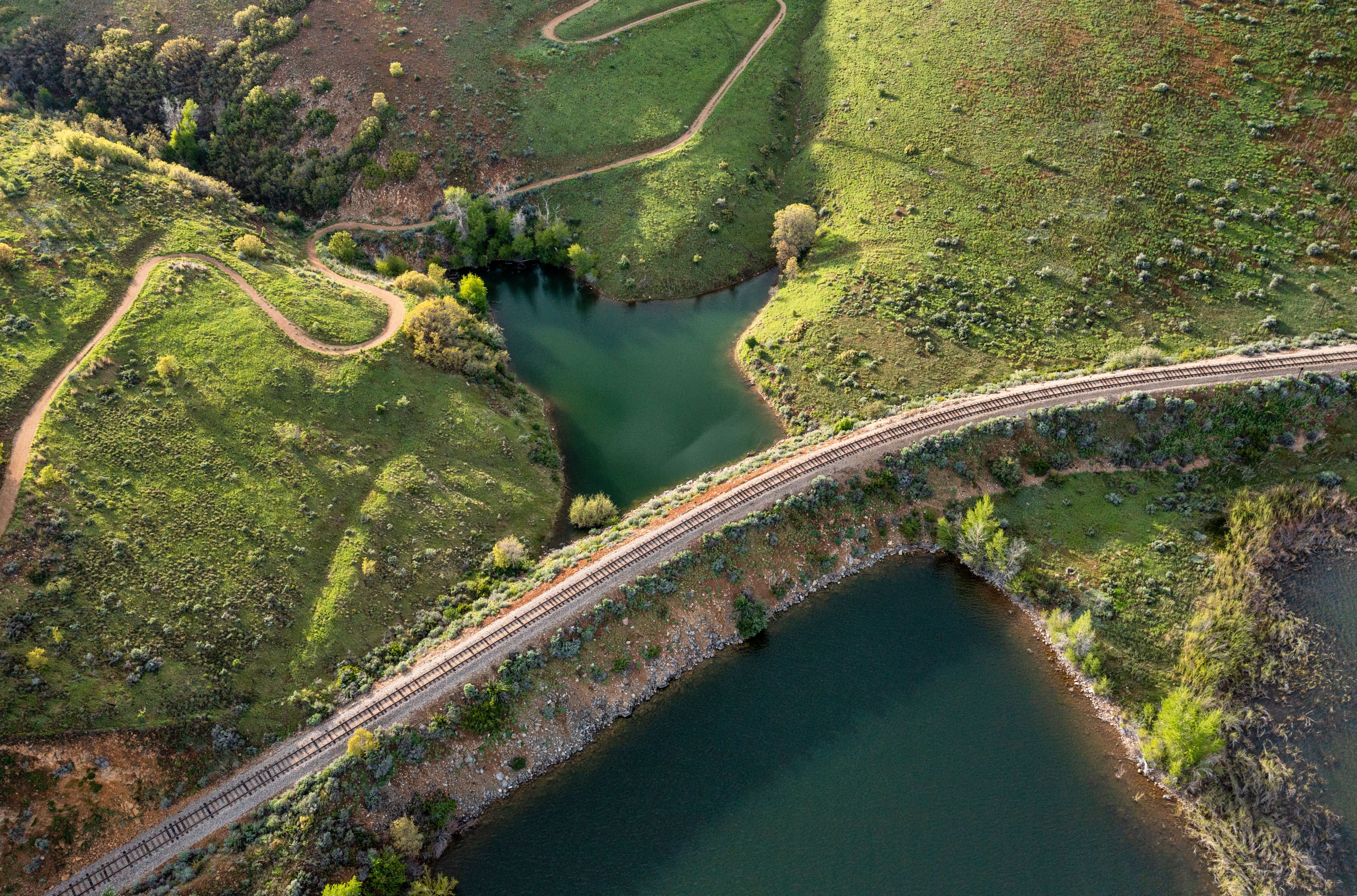 Scenic Aerial View of a Road Over a River on a Countryside · Free Stock ...