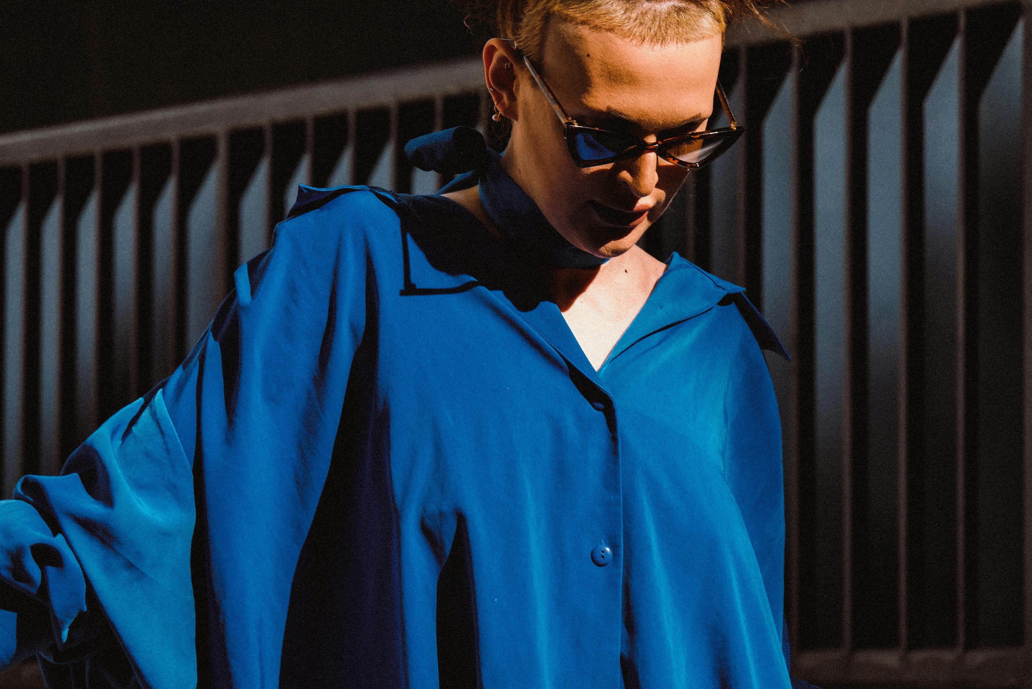 Woman Wearing Blue Collared Top · Free Stock Photo