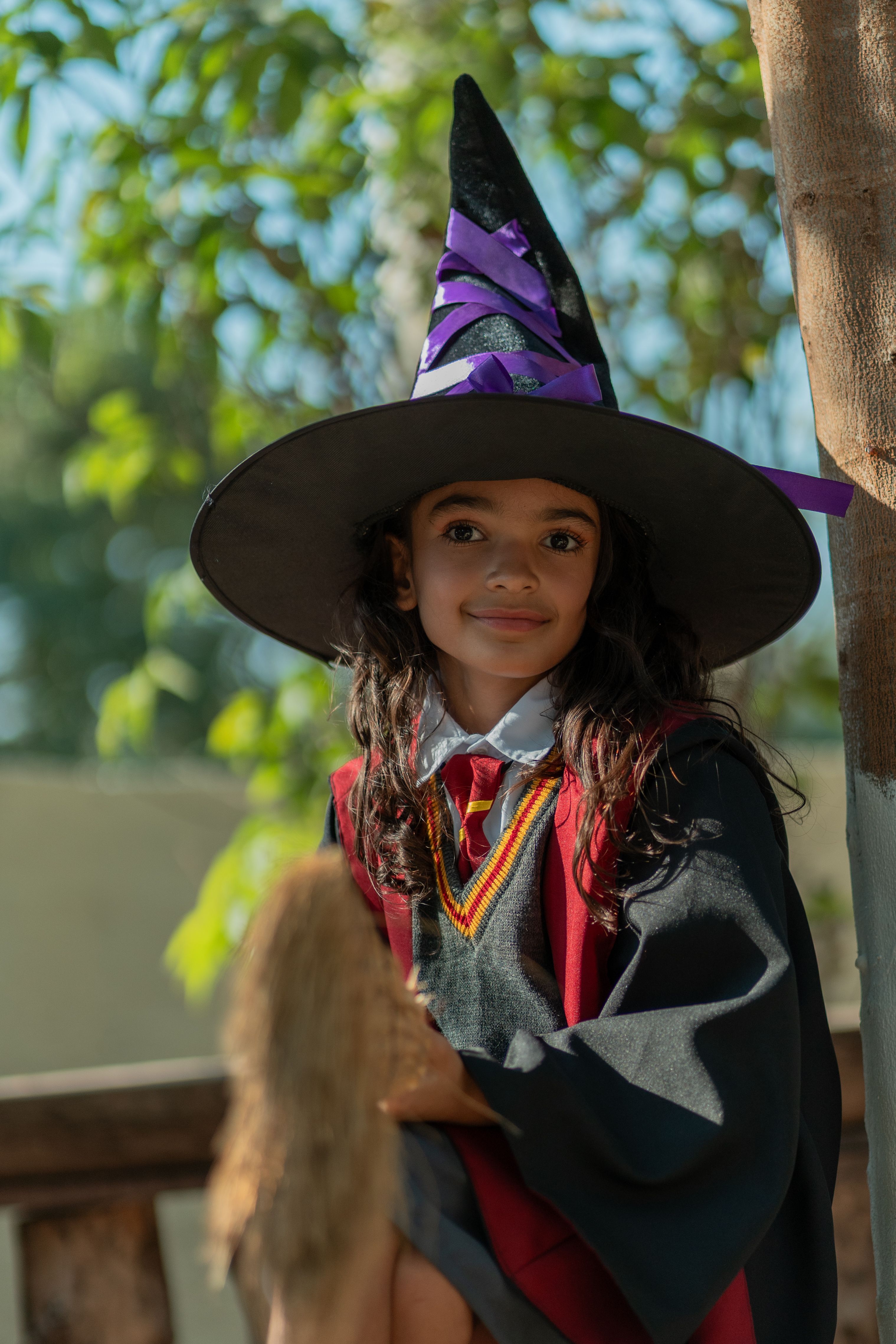 Girl Wearing a Witch Costume · Free Stock Photo