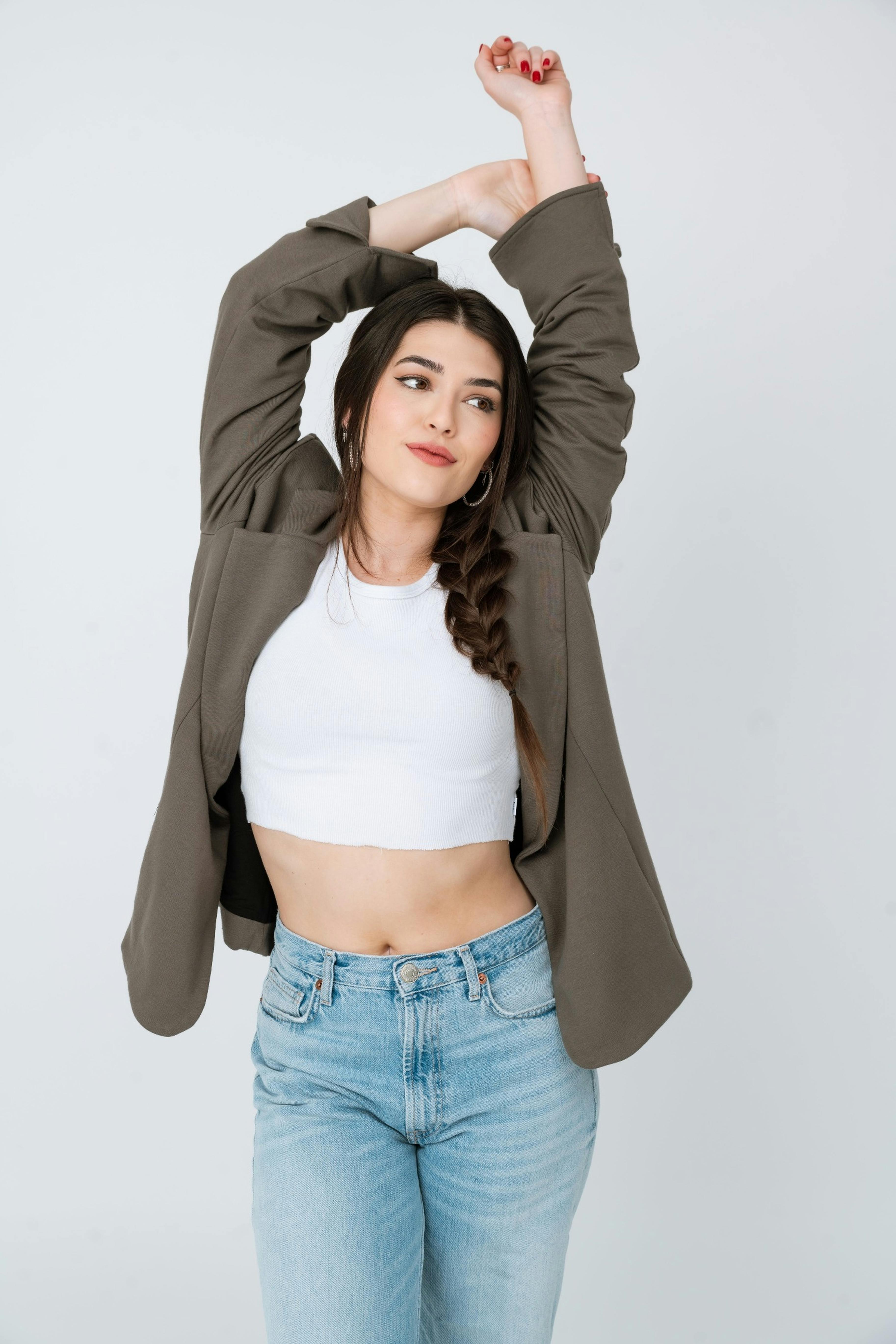 Woman Posing with Arms Up · Free Stock Photo