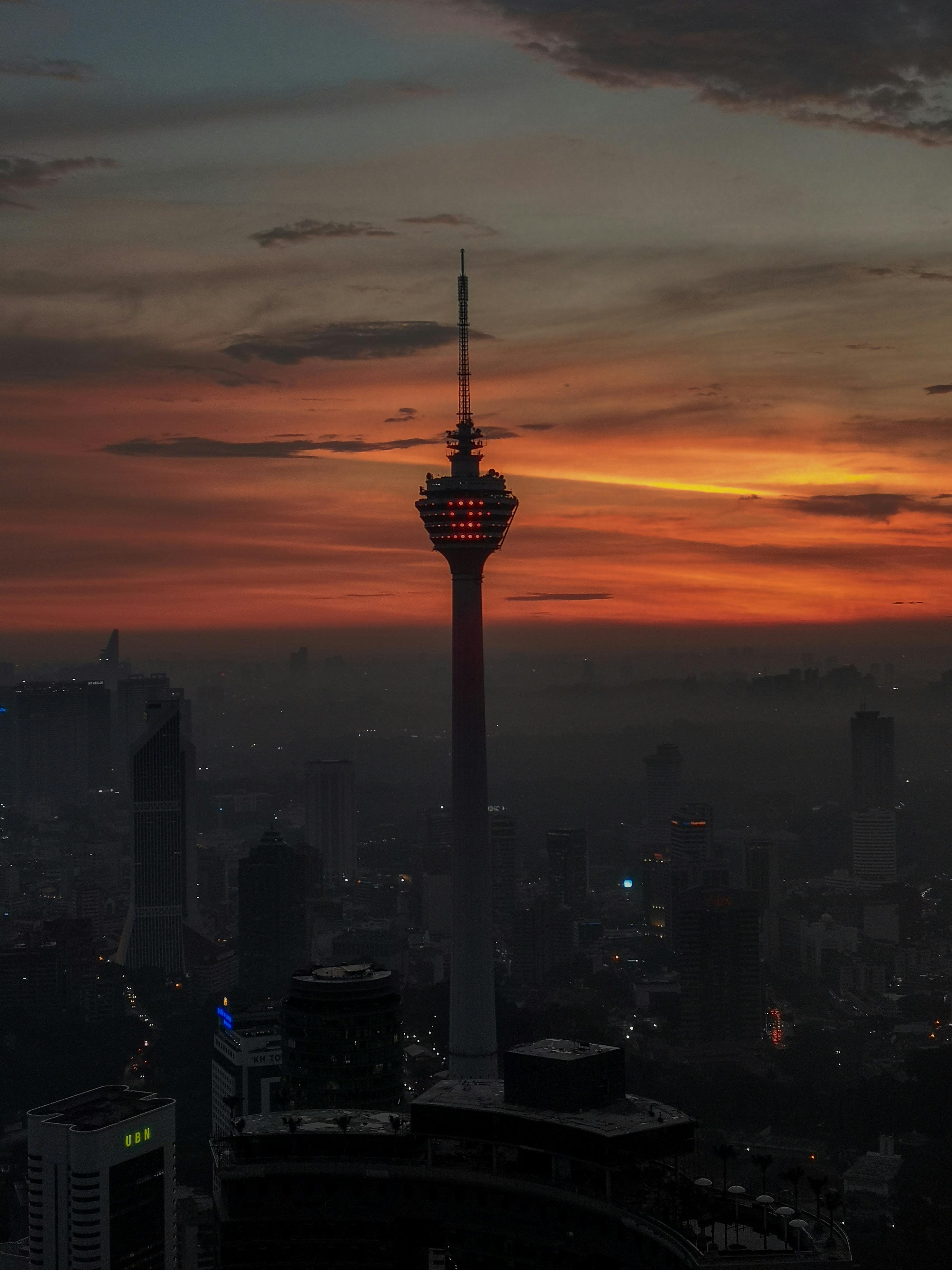 Lighted High-rise Buildings · Free Stock Photo