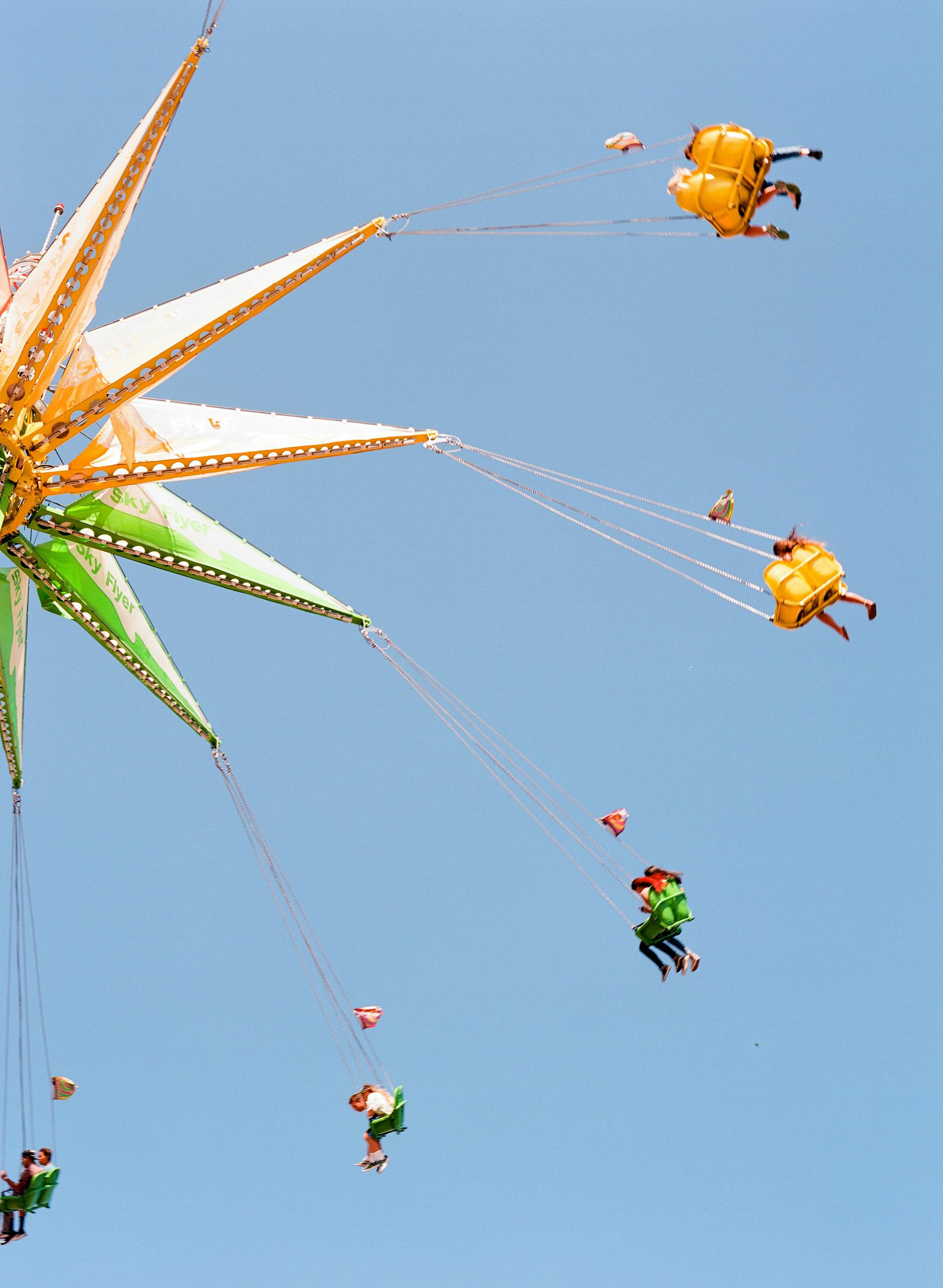 People on a Carousel in Funfair · Free Stock Photo