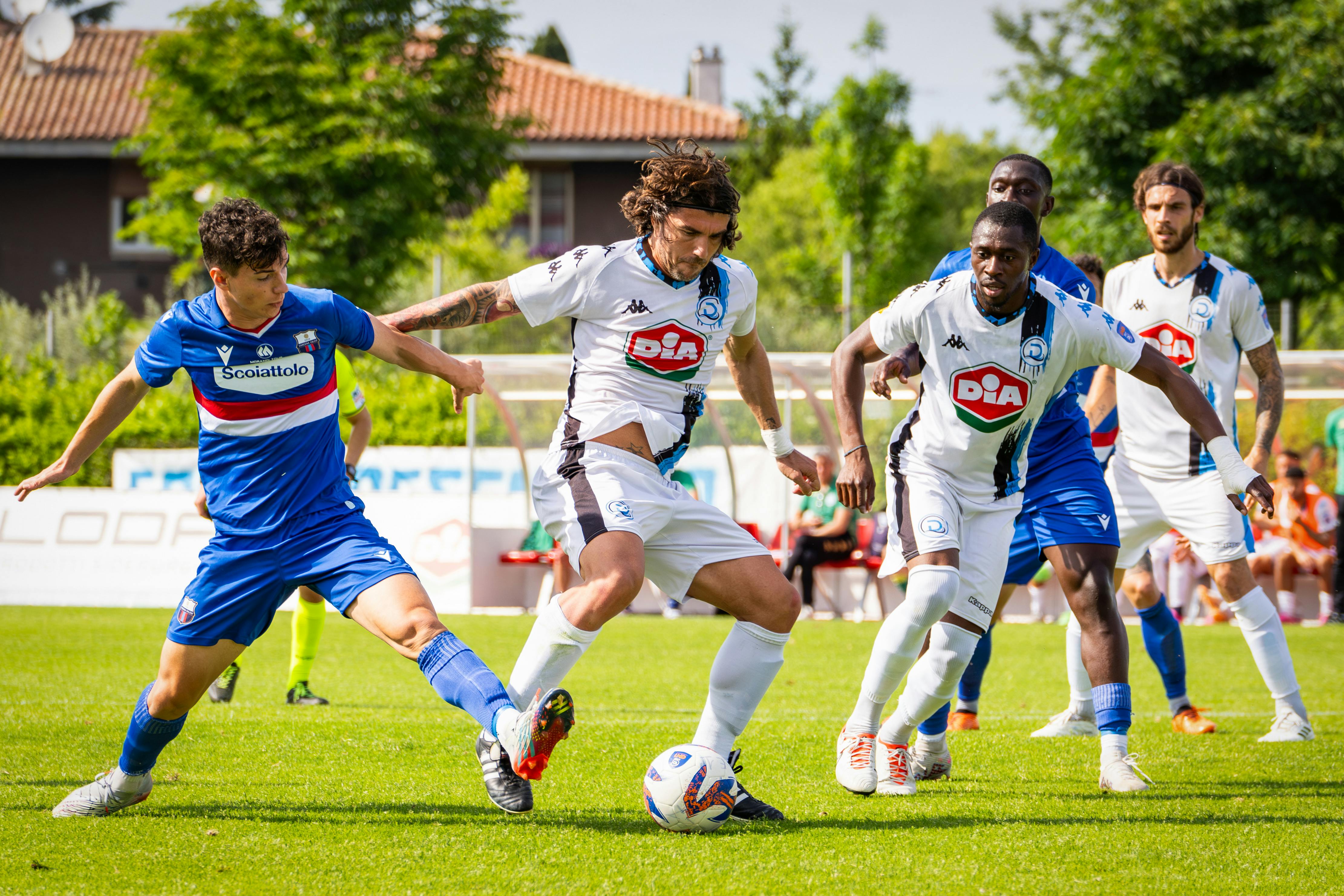 Group of Men Playing Soccer · Free Stock Photo