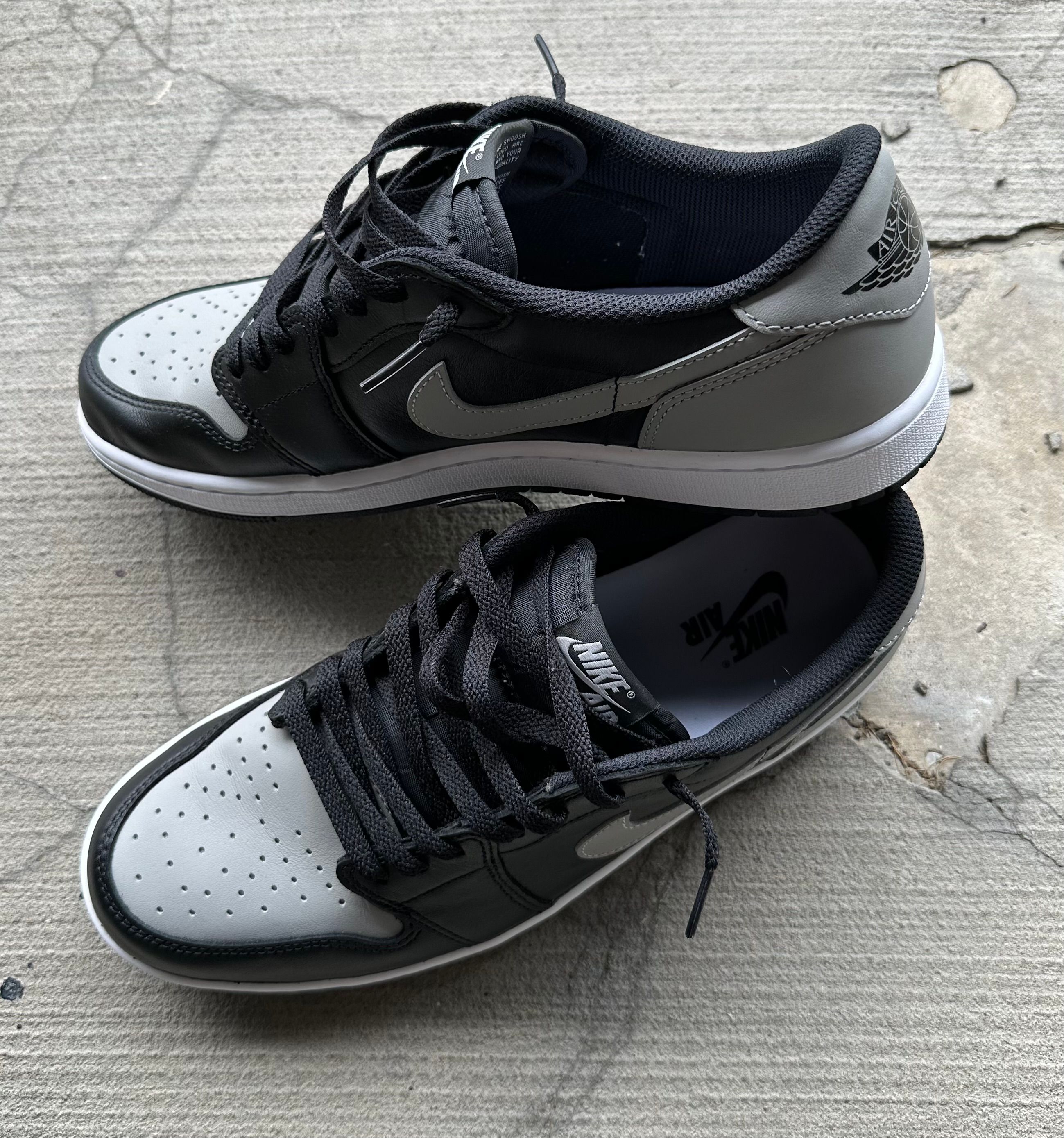 A Grayscale Photo of a Sneakers · Free Stock Photo