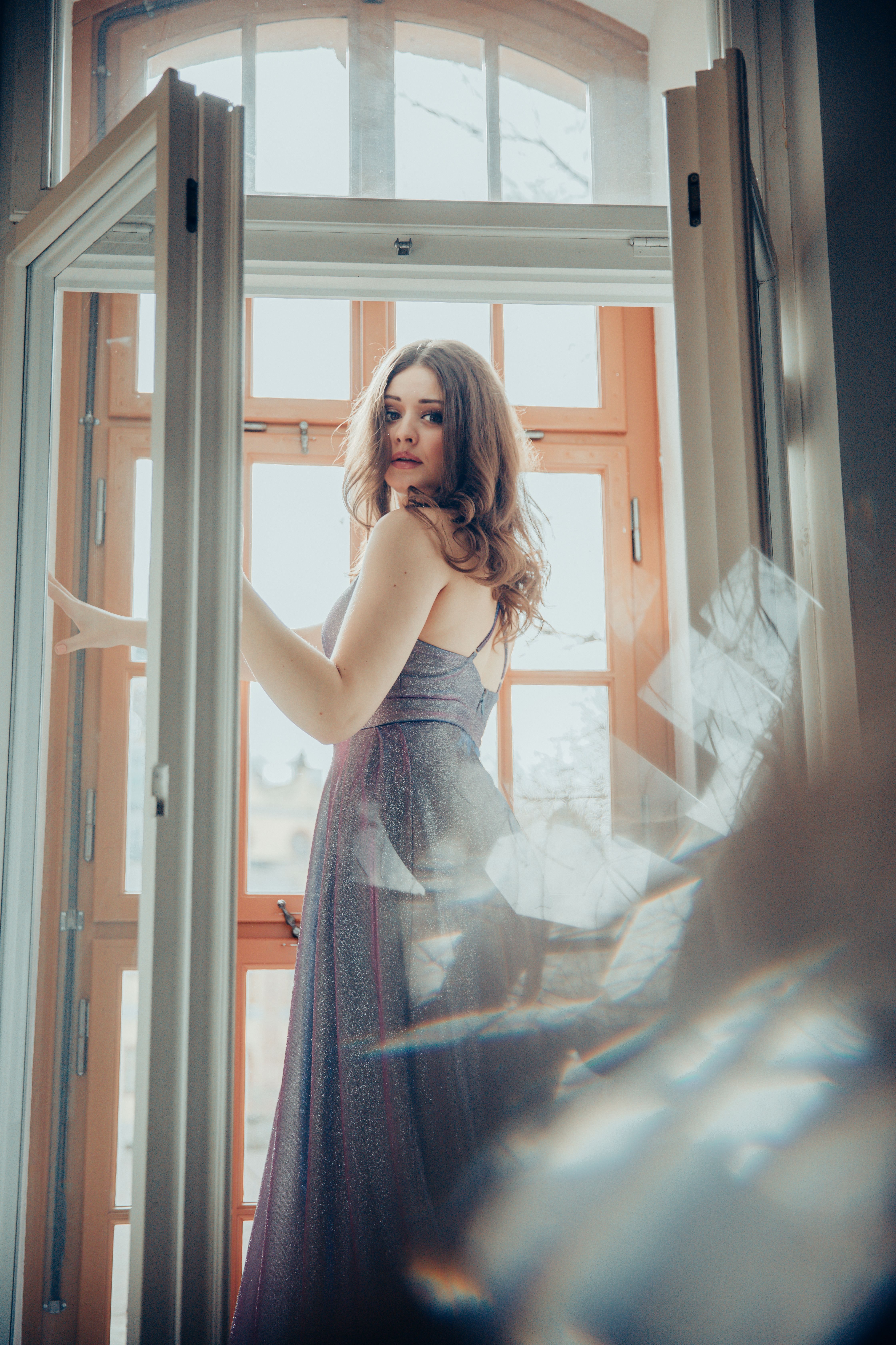 Woman Standing in the Window · Free Stock Photo