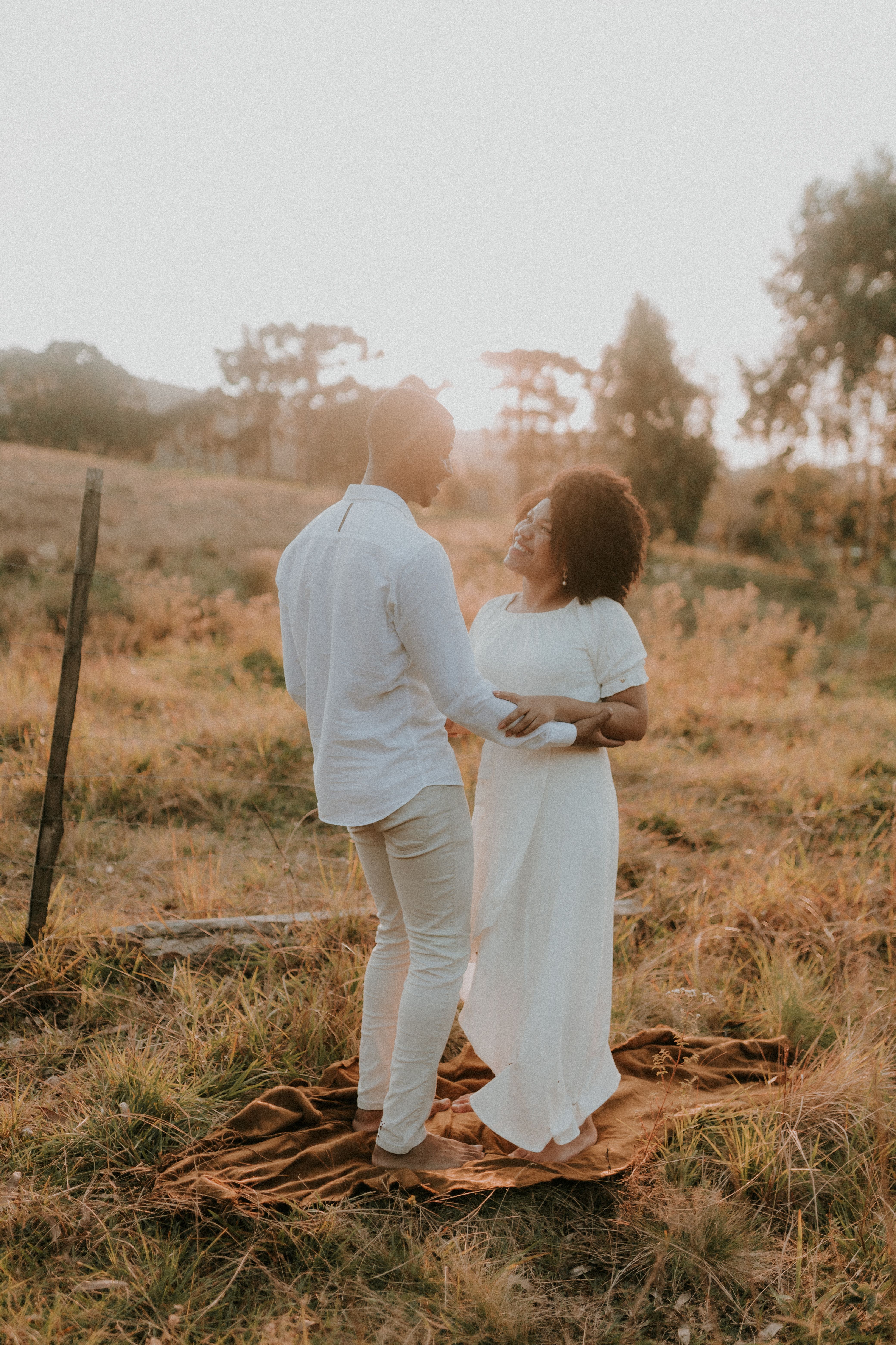 Romantic Golden Hour Couple Embrace Outdoors · Free Stock Photo
