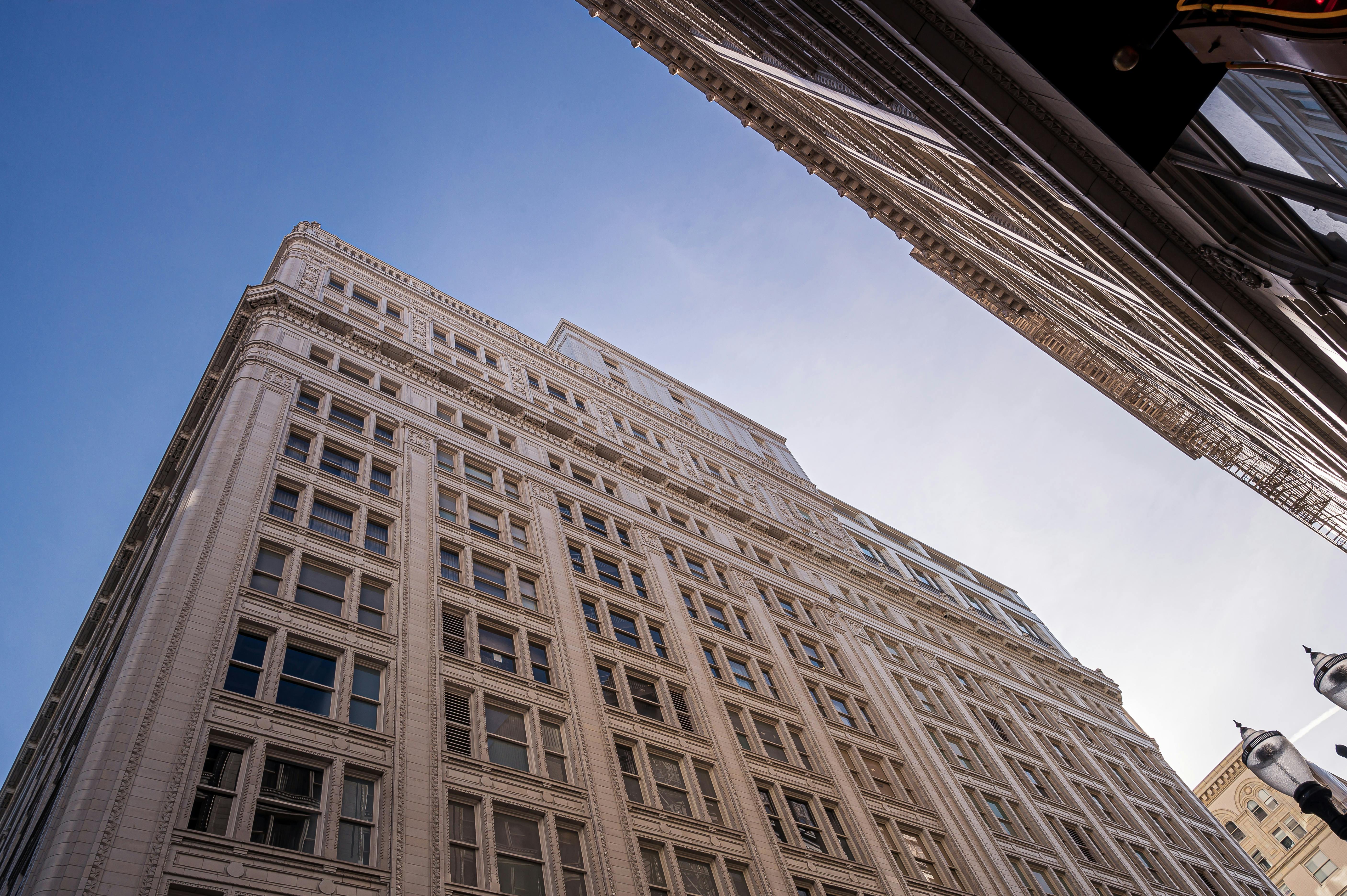 Worm View Photo of Brown Concrete Building · Free Stock Photo