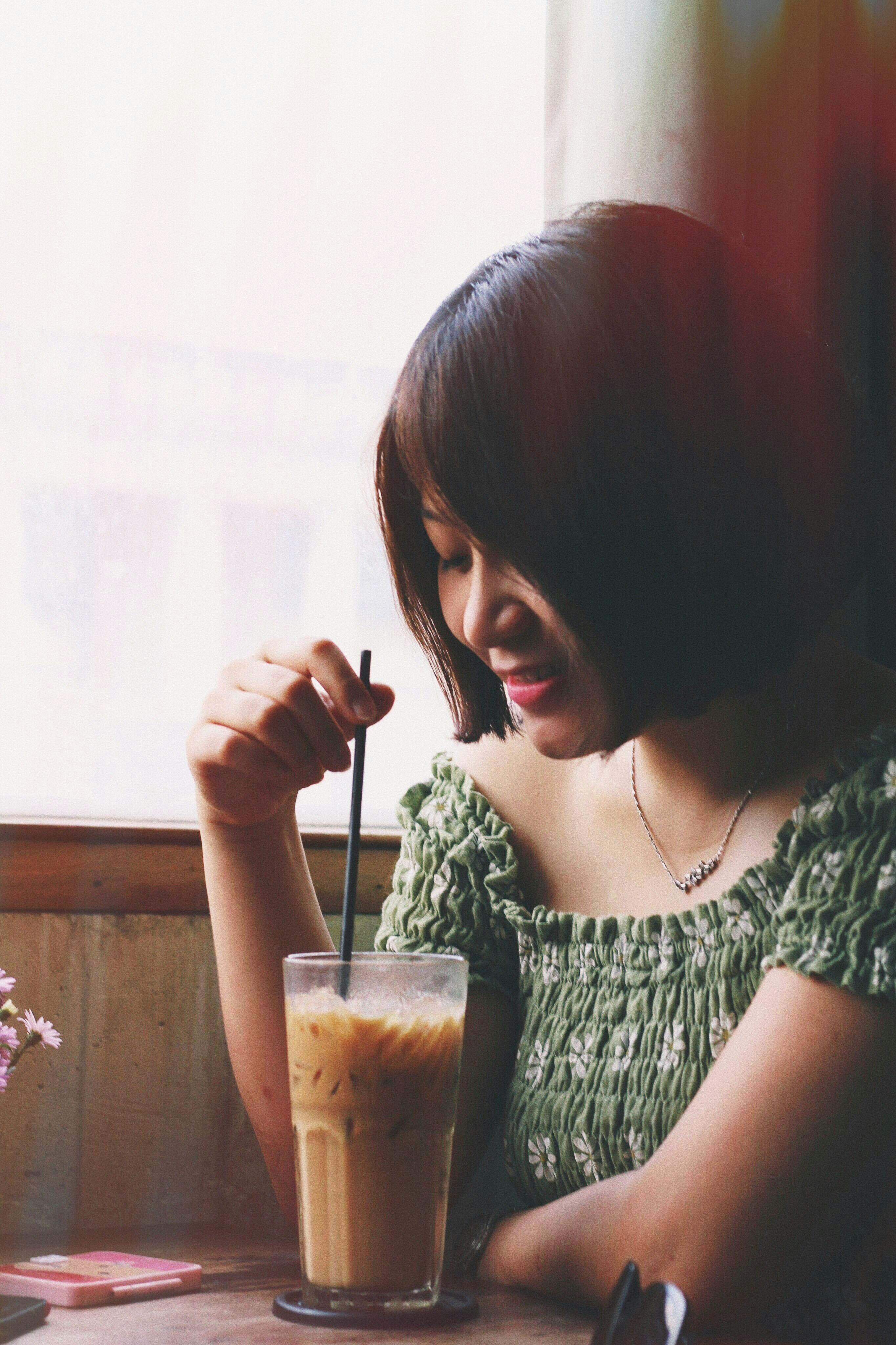 Woman Sipping from Cup · Free Stock Photo