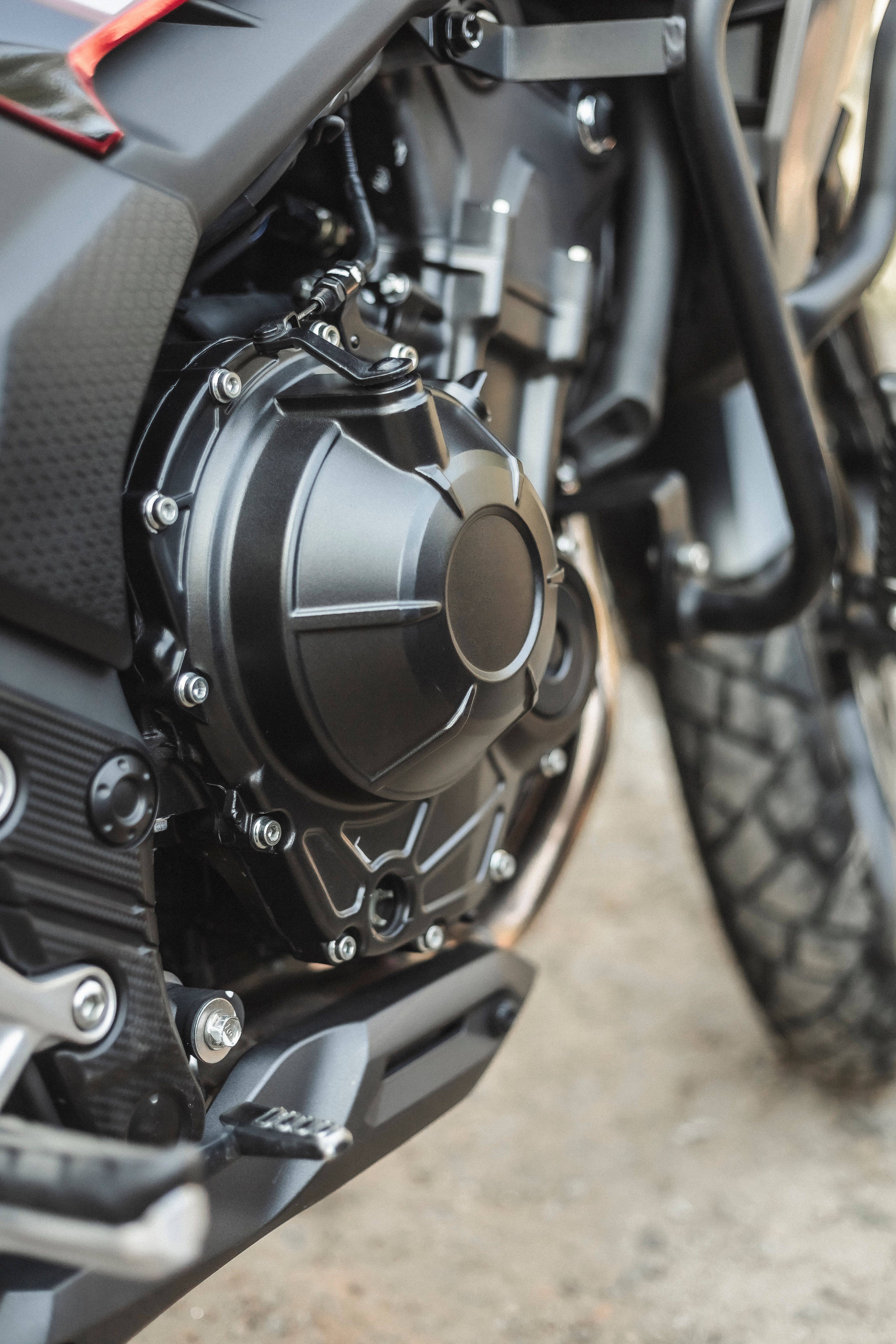 A close up of a motorcycle's engine cover · Free Stock Photo