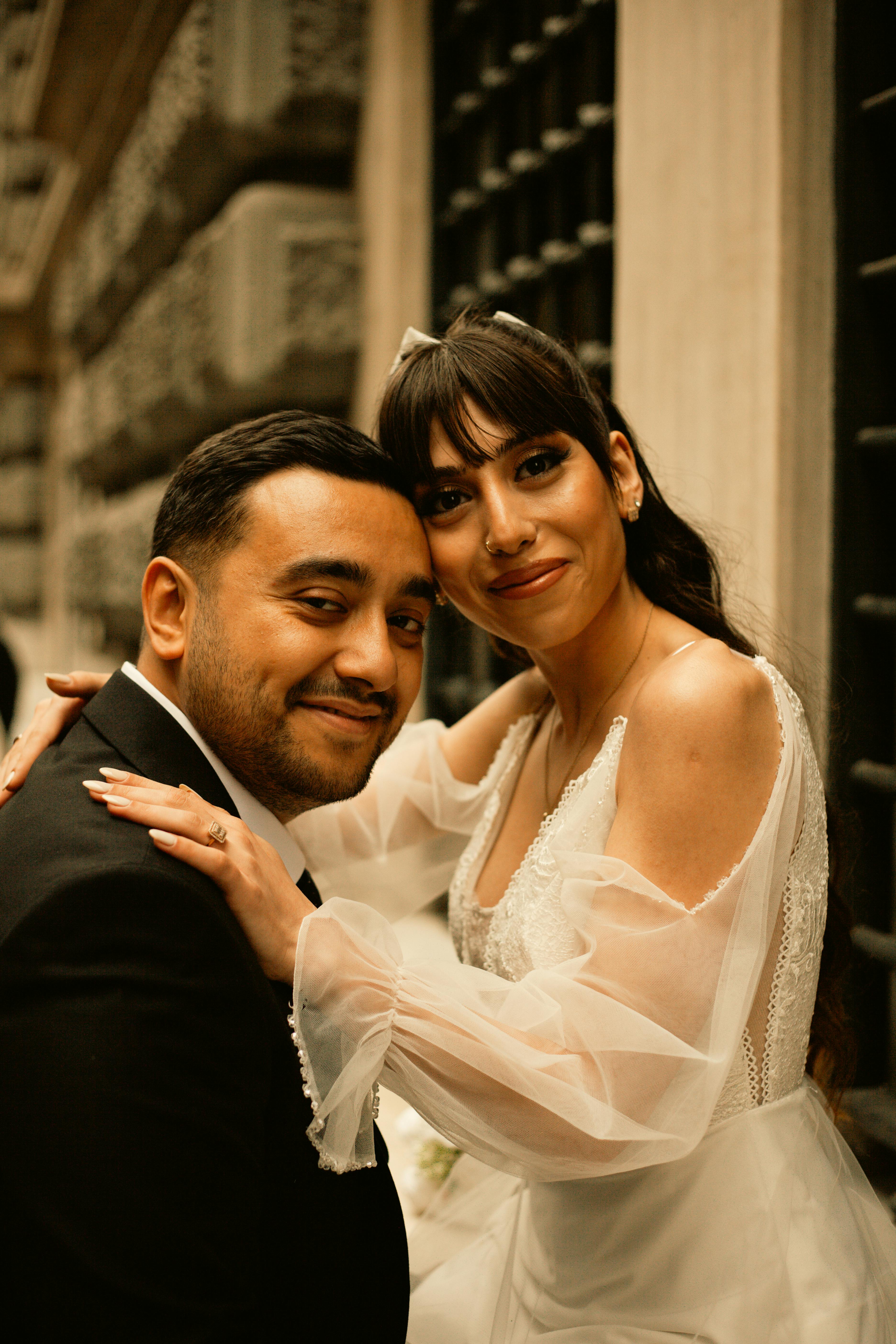 Portrait of Wedding Couple in Front of a Church · Free Stock Photo