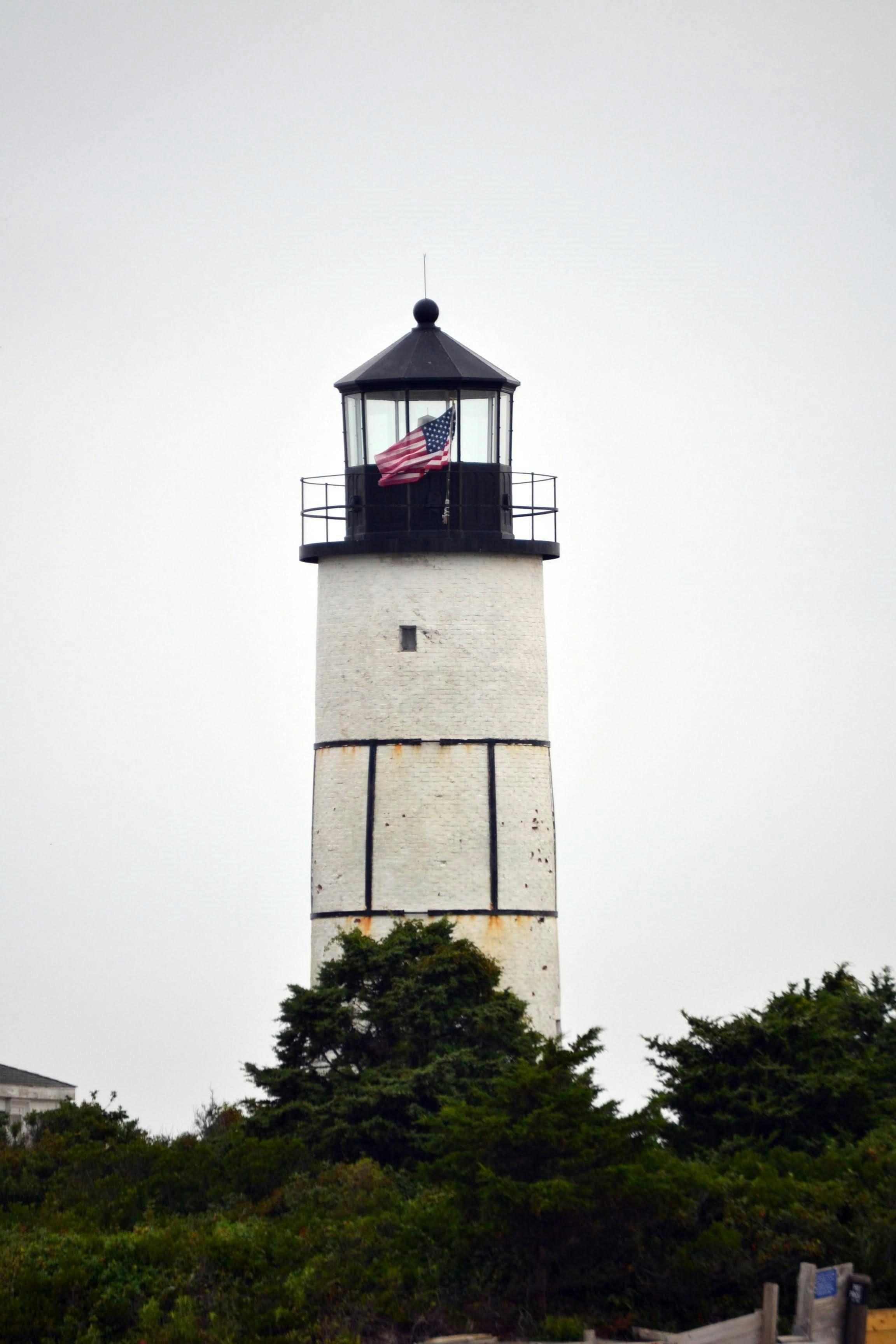 Gray Scale Photography of Lighthouse · Free Stock Photo