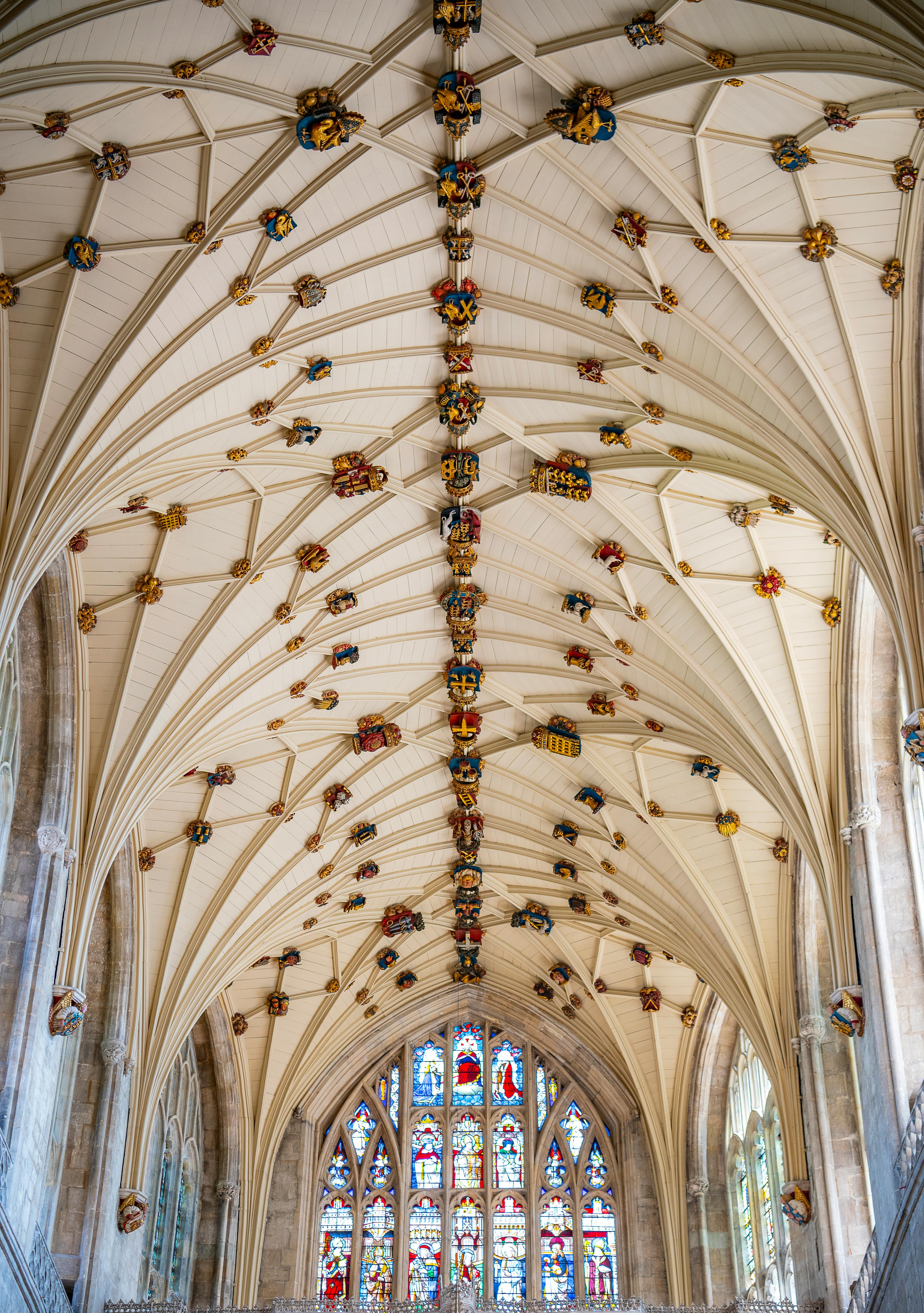 Chandelier on arched ceiling of old cathedral · Free Stock Photo