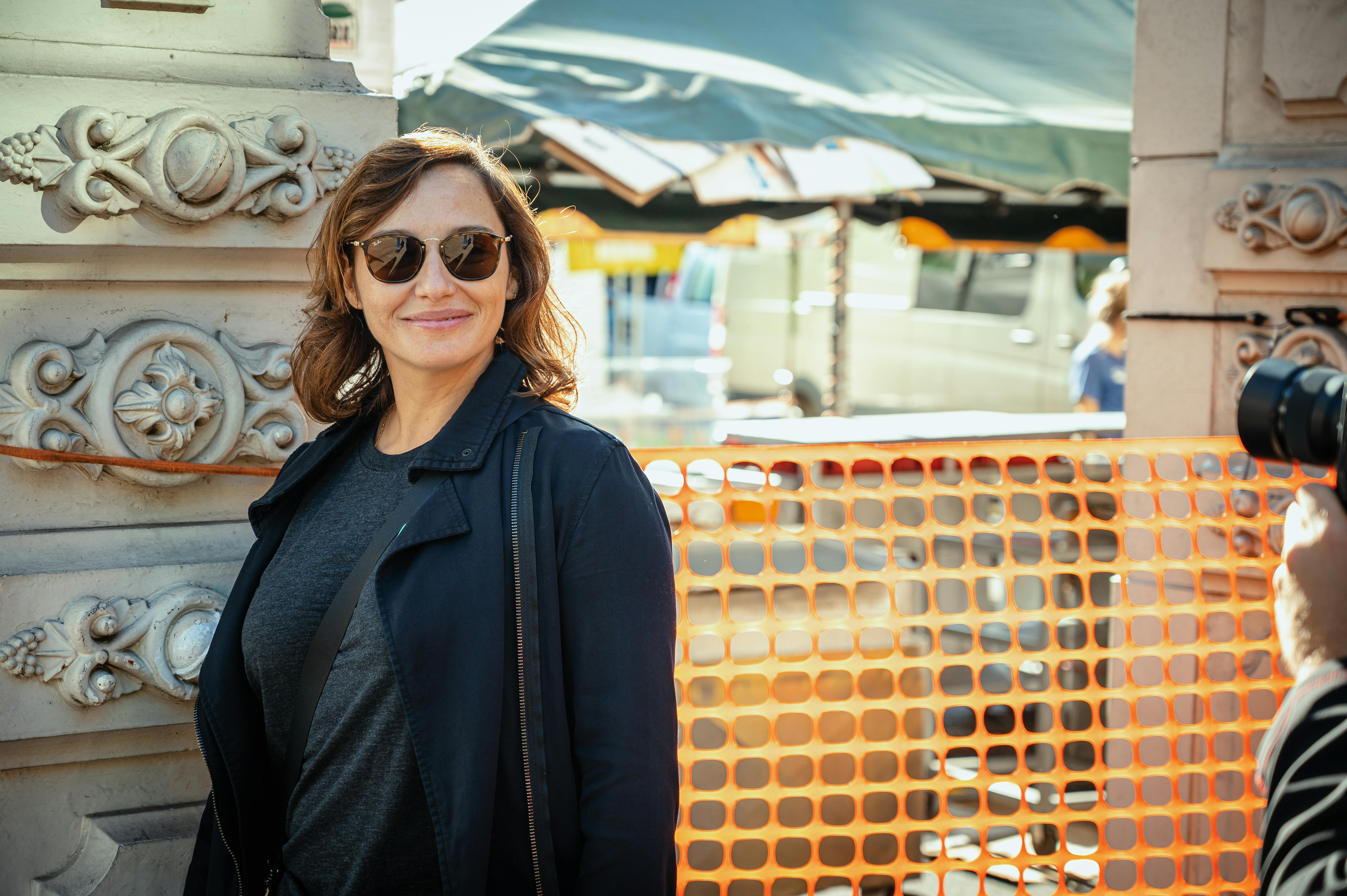 Woman Standing Outside And Smiling · Free Stock Photo