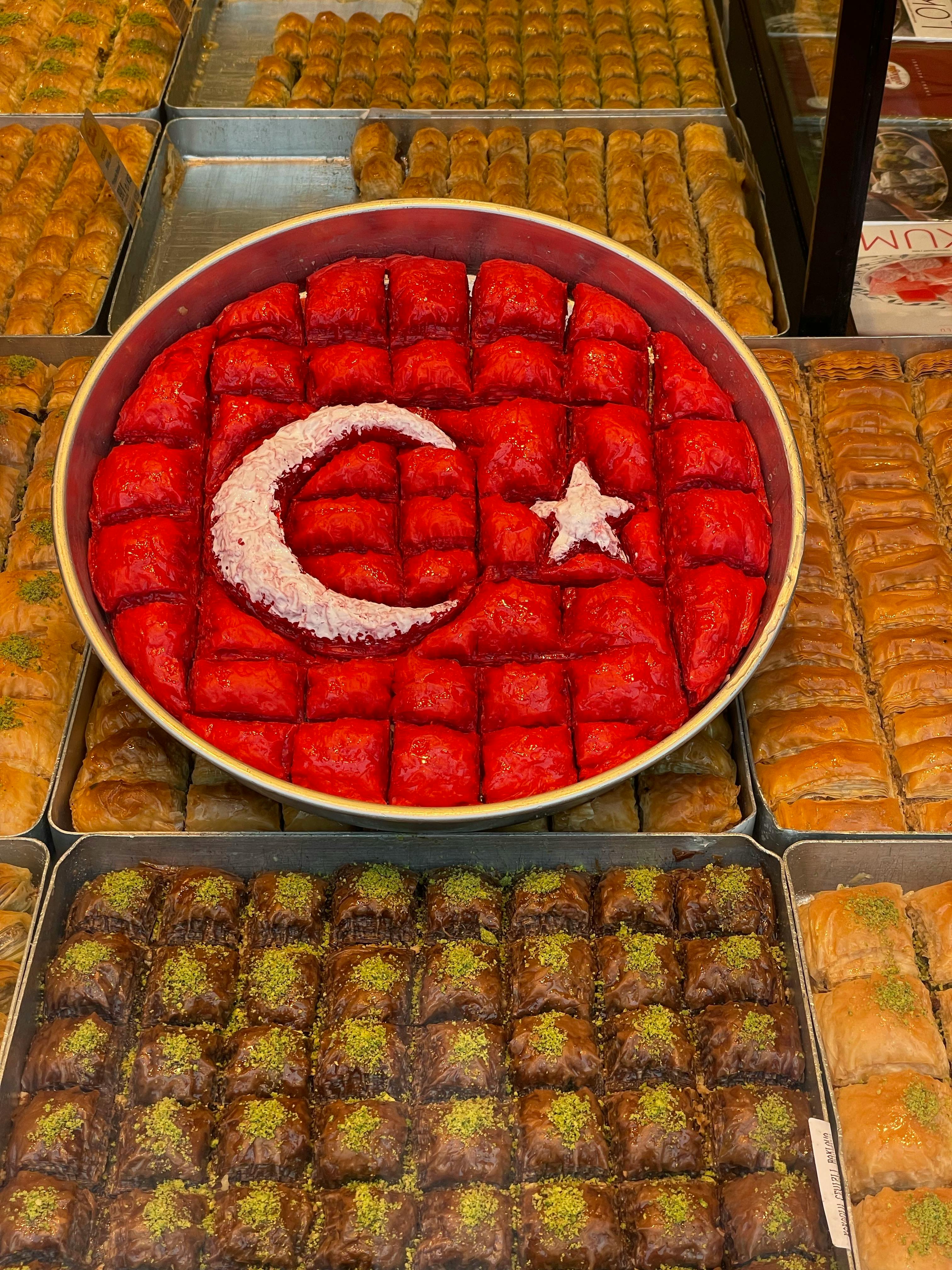 A tray of pastries with a turkish flag on it · Free Stock Photo