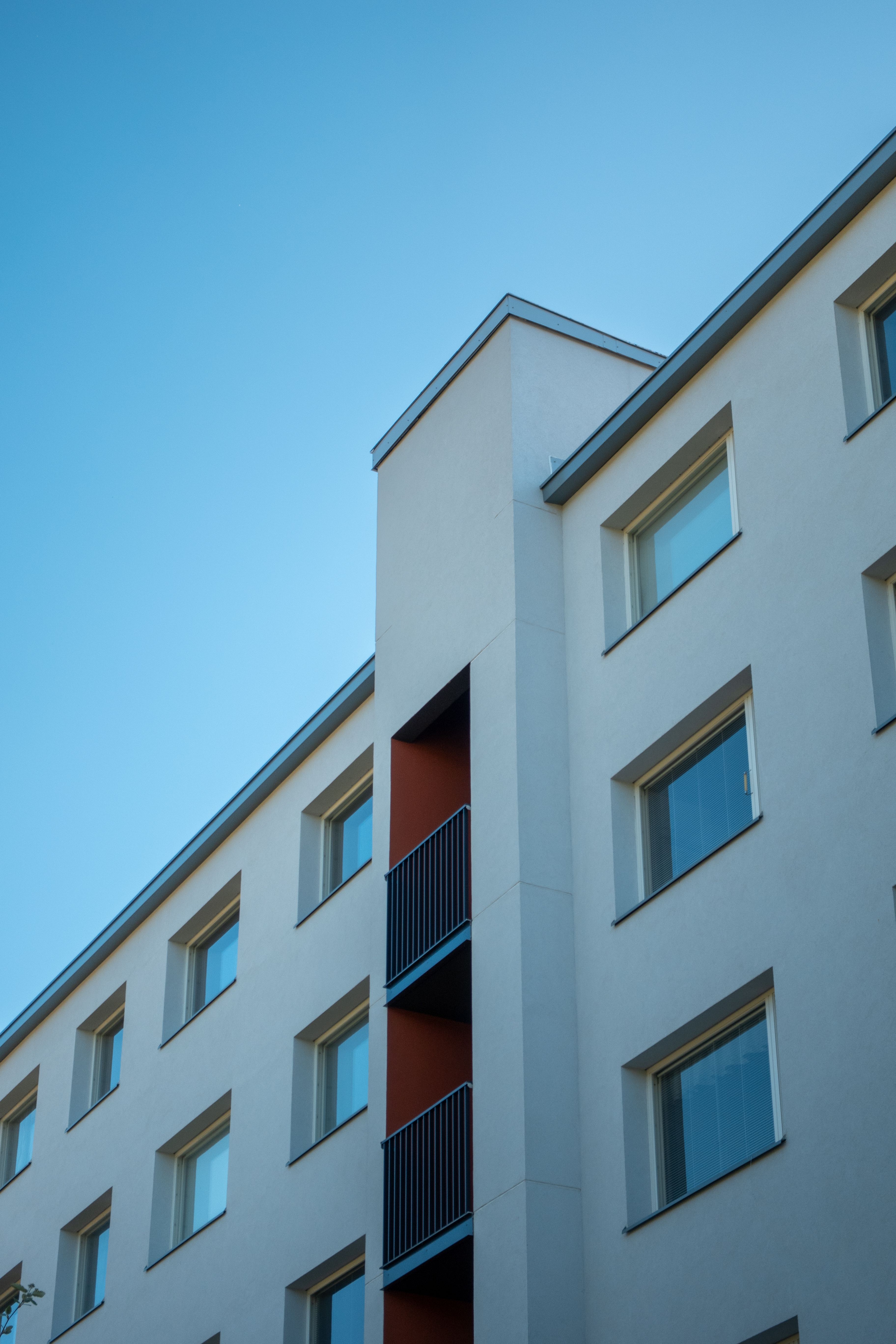 Modern building with blue windows · Free Stock Photo