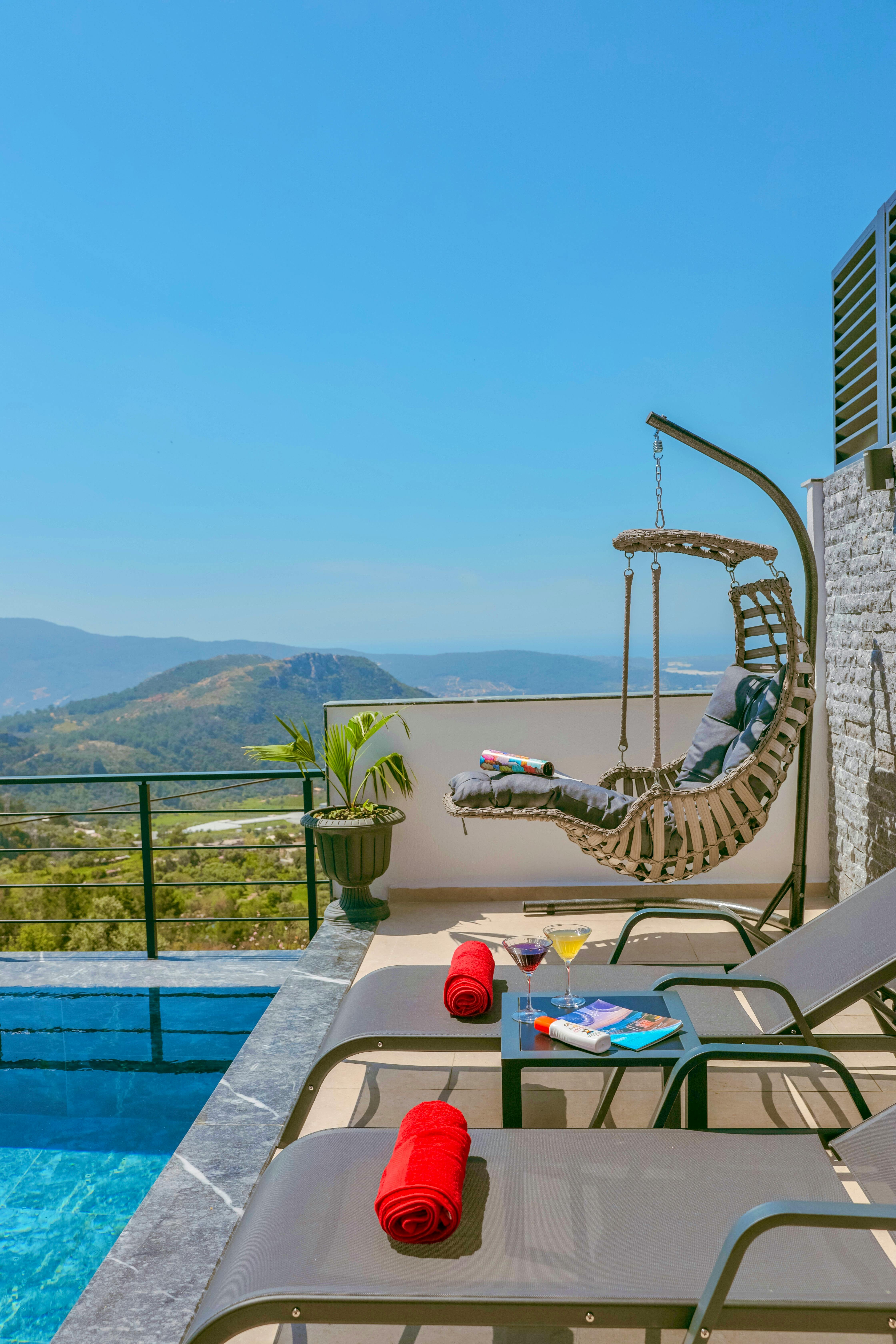 Brown Lounge Chair on Side of Swimming Pool · Free Stock Photo