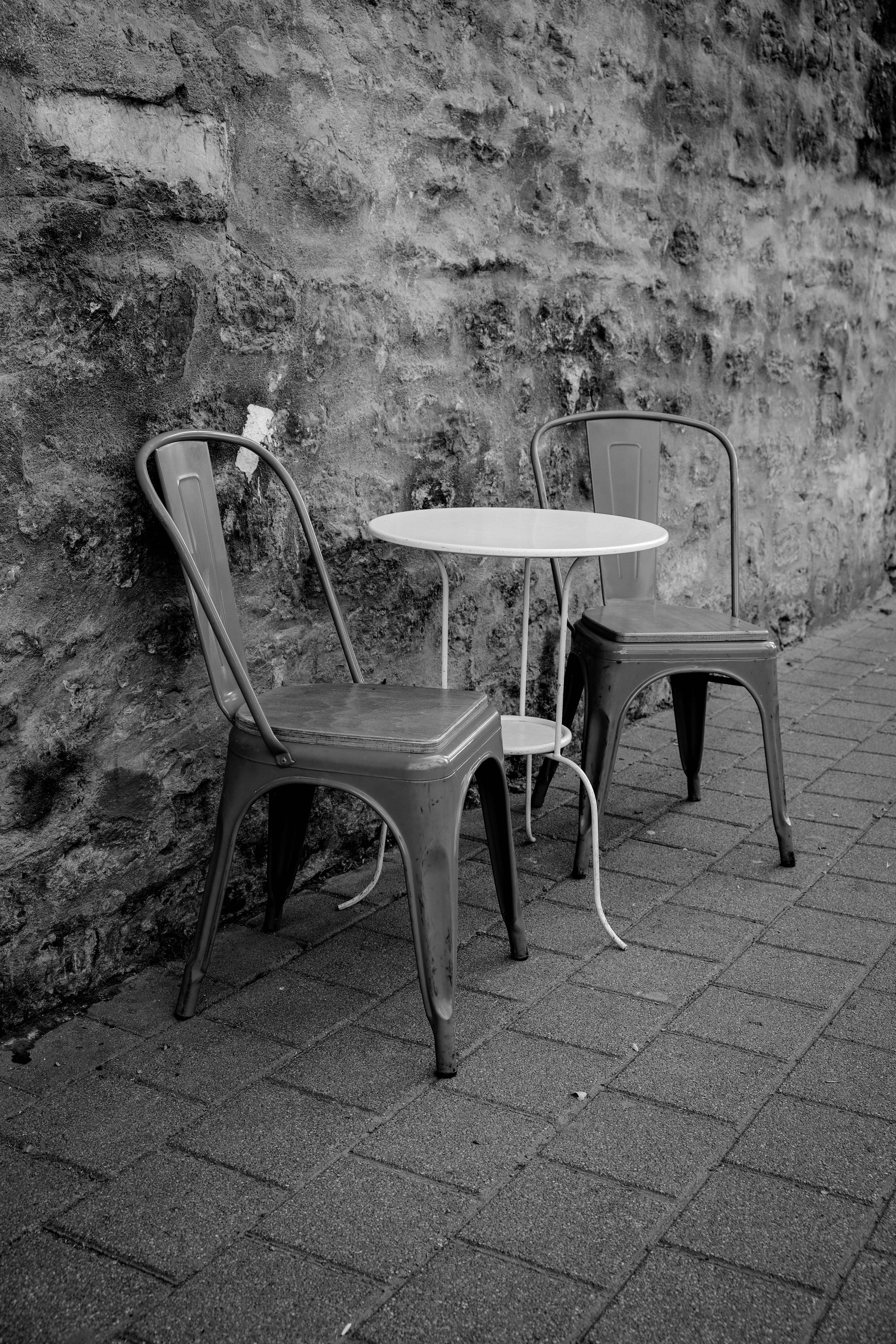 Table and Chairs on Pavement · Free Stock Photo